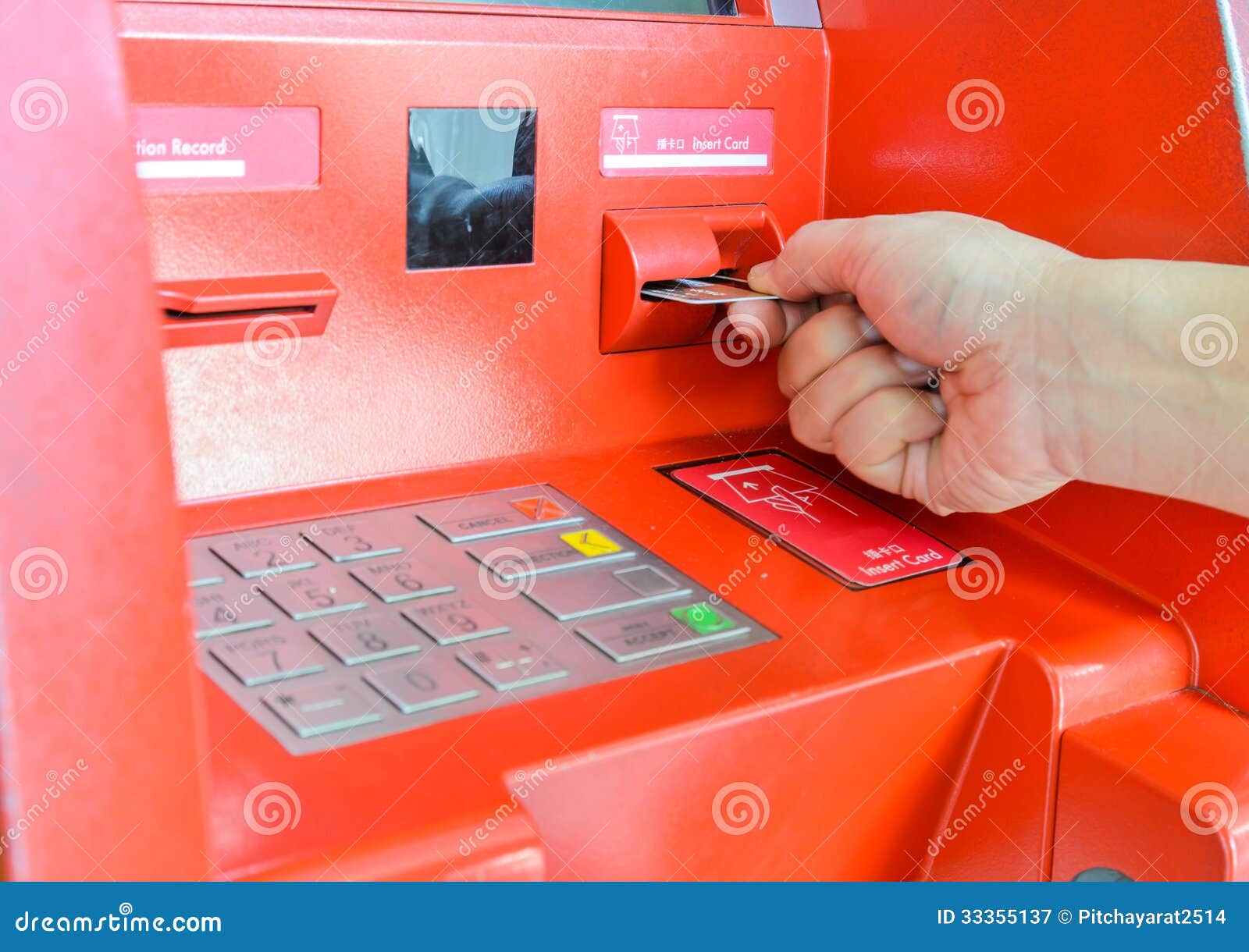 Hand inserting ATM card stock image. Image of business - 33355137