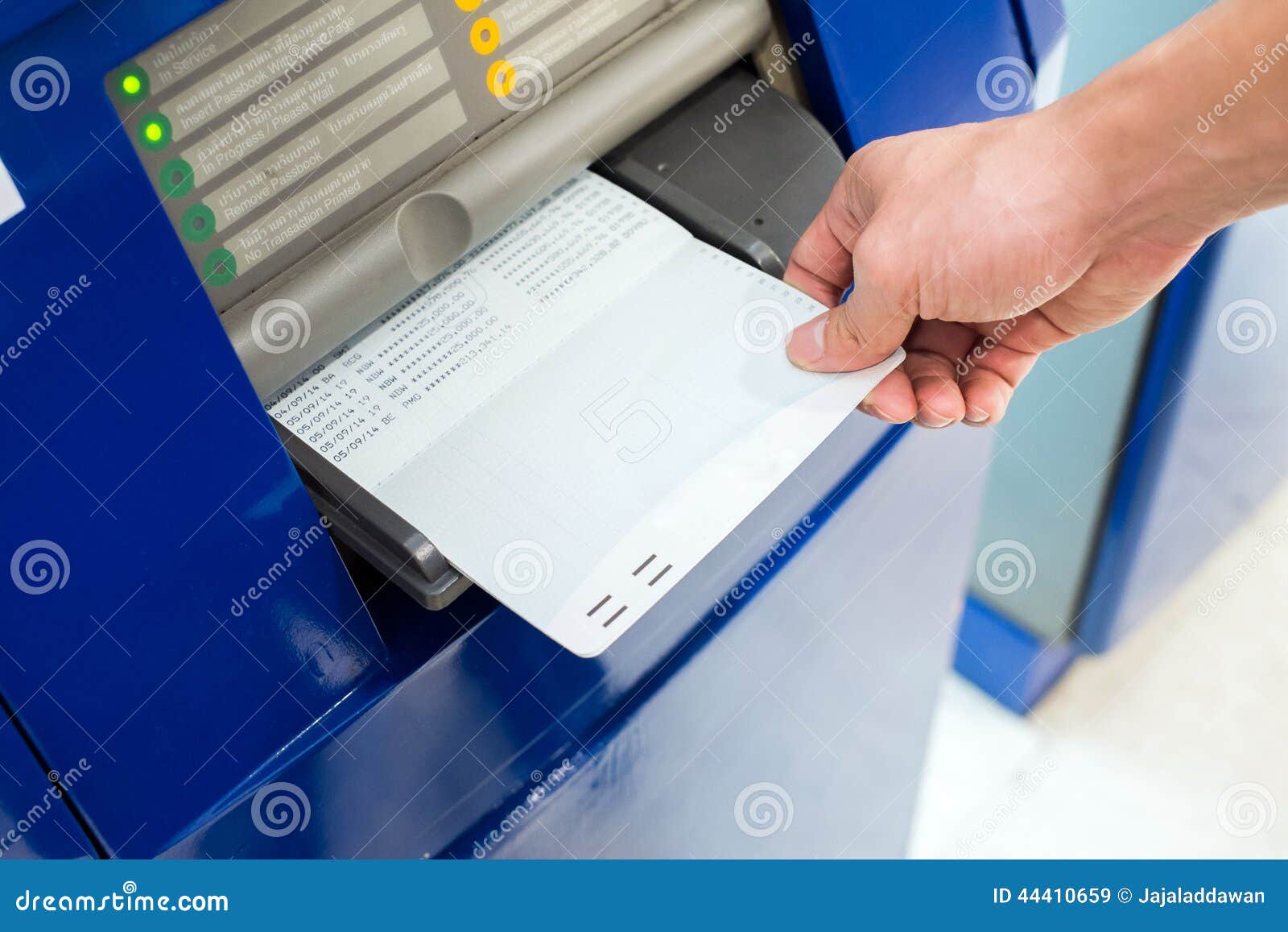 Hand inserting bankbook editorial stock image. Image of human - 44410659