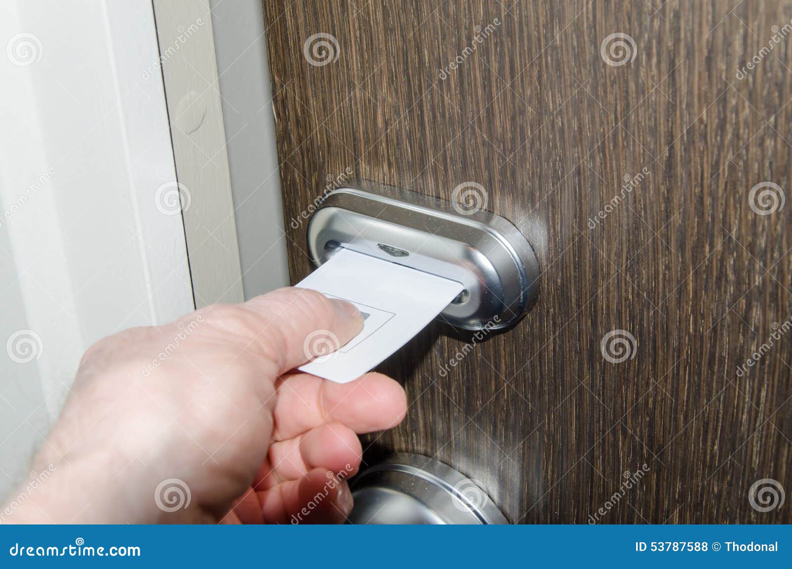 Hand inserting keycard stock photo. Image of secure, card - 53787588
