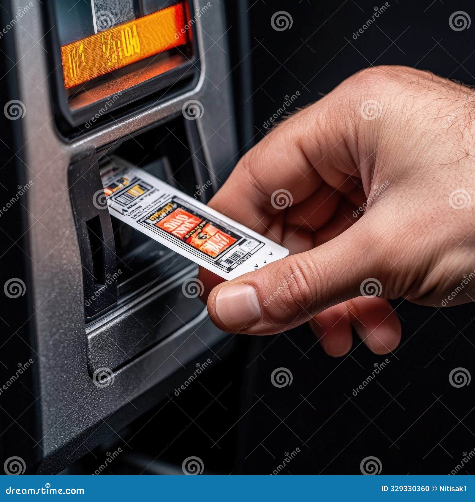 A Hand Inserting a Ticket into a Vending Machine Showcasing the ...