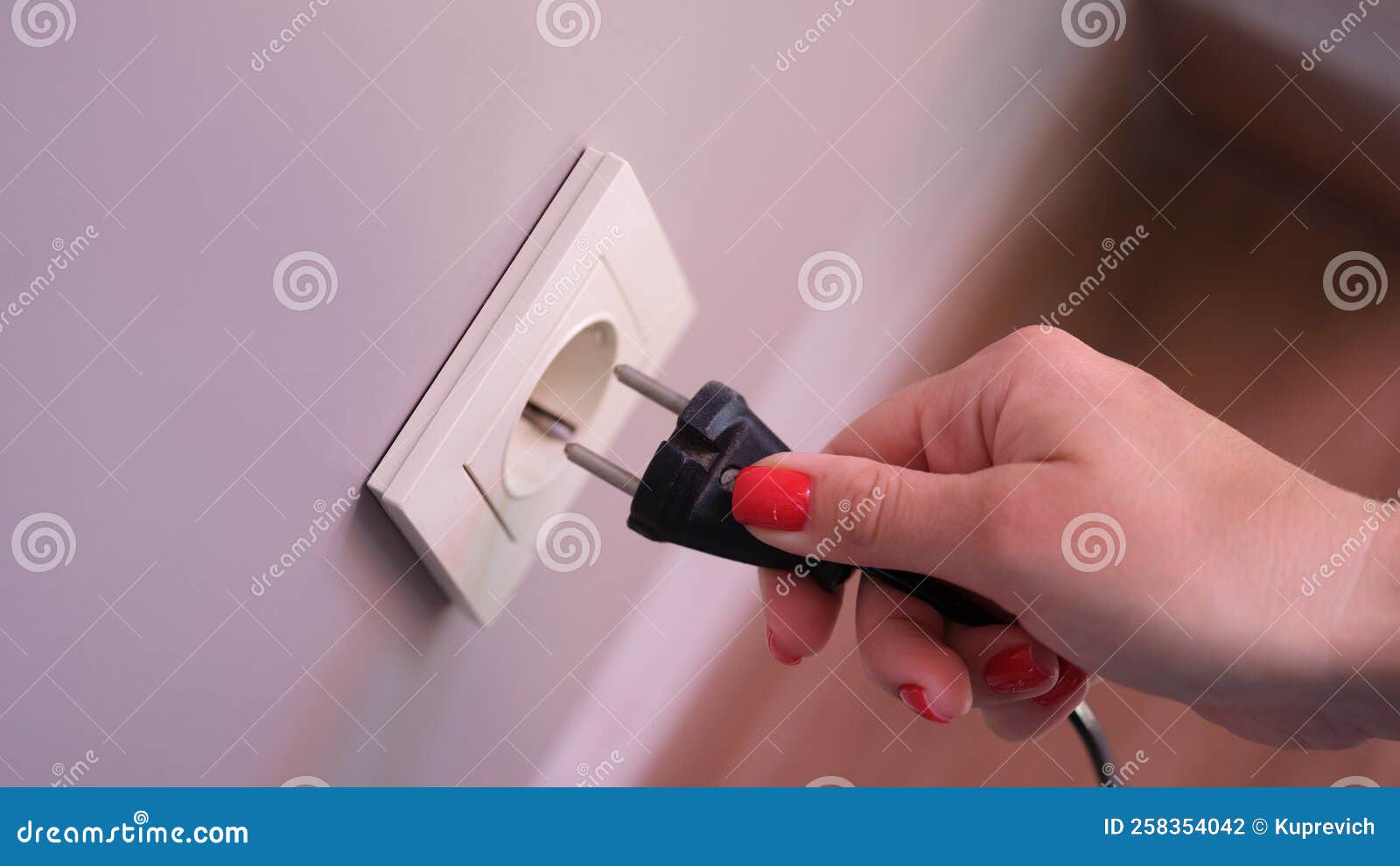 Hand Inserts Plug into Socket Closeup. Use of Promising Energy in Home ...