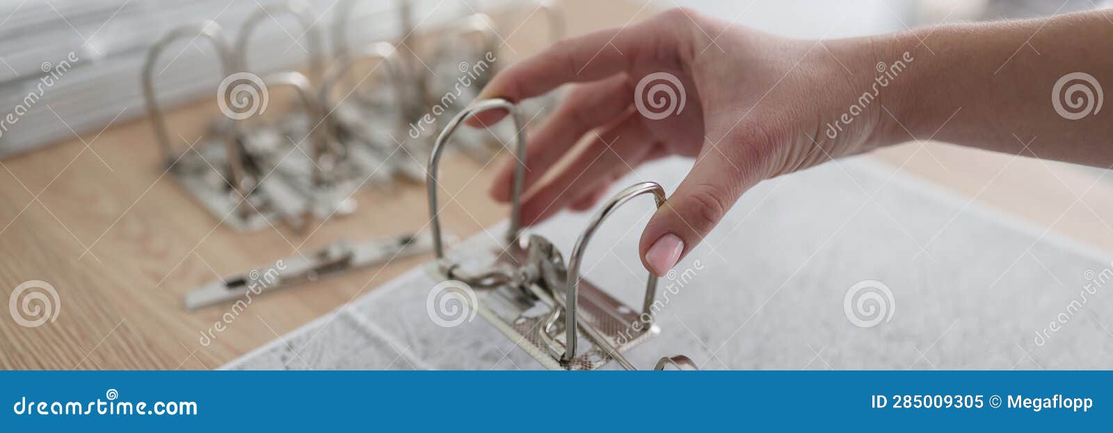 The Hand Inserts the Ring Mechanism into the Folder Stock Image - Image ...