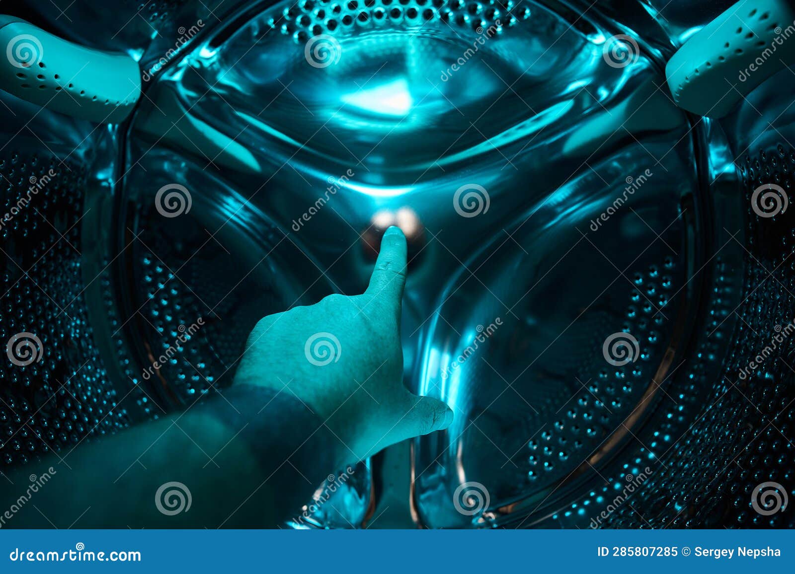 A Hand Inside Washer Pointing a Finger Stock Image - Image of modern ...
