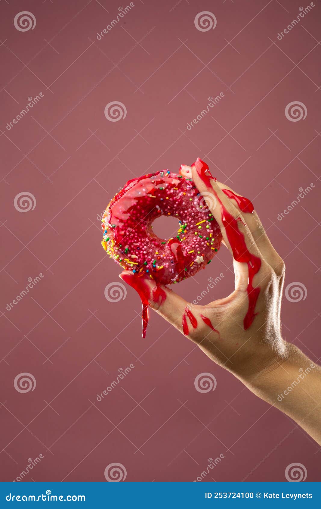 A Hand in Jam Holds a Donut with Icing Stock Photo - Image of pouring ...