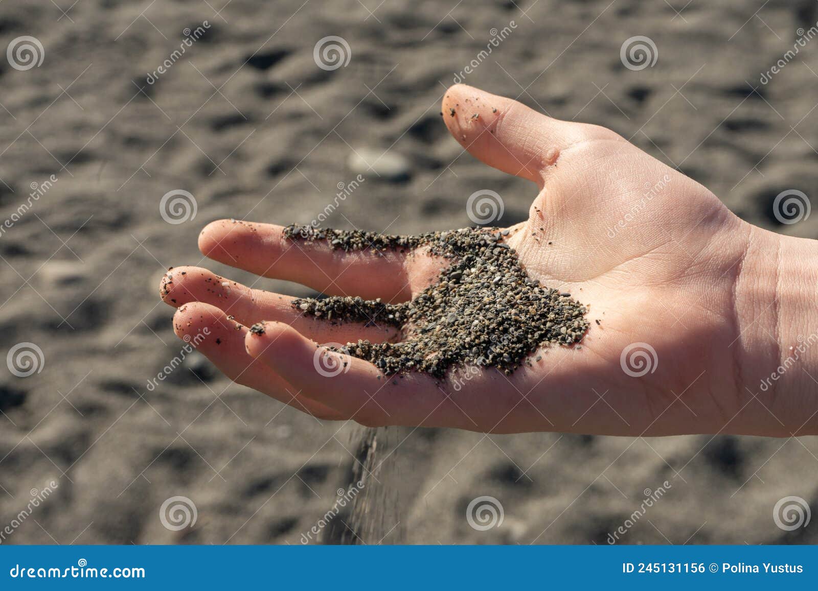 Hand keeps some sand stock photo. Image of hand, food - 245131156