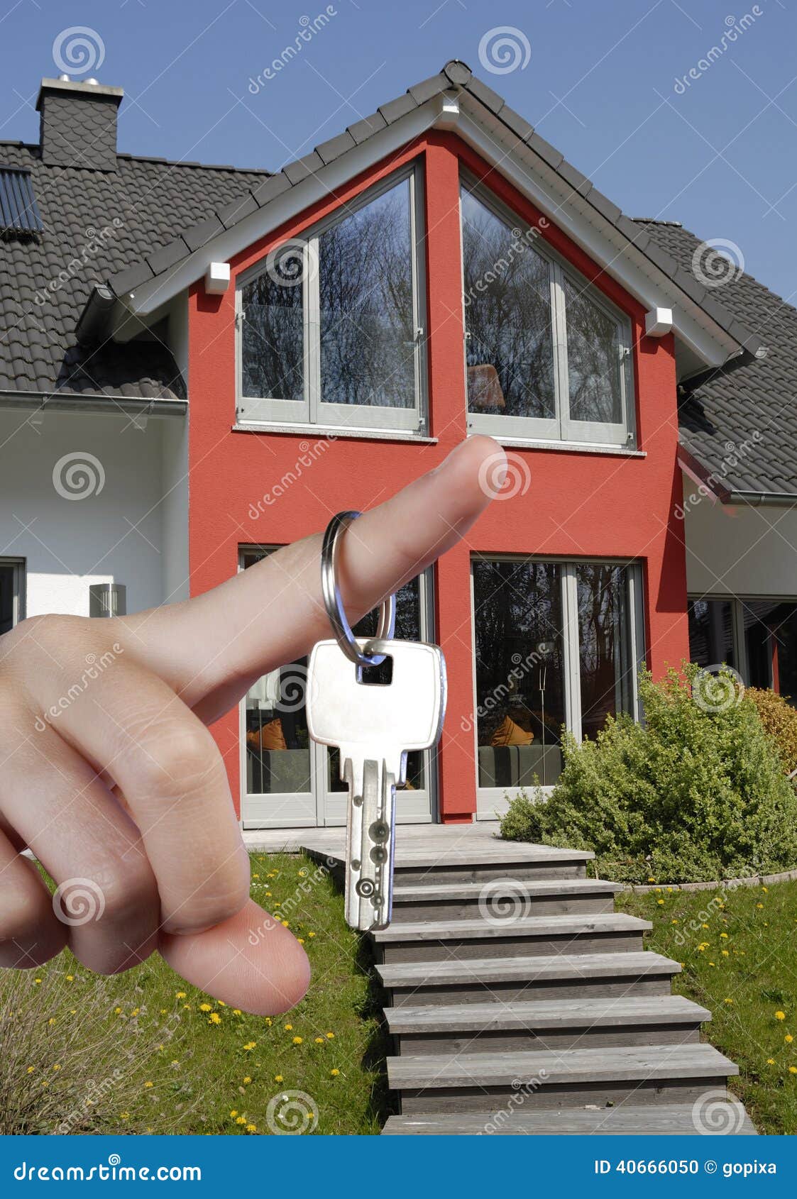 Hand with key and house stock photo. Image of construction - 40666050