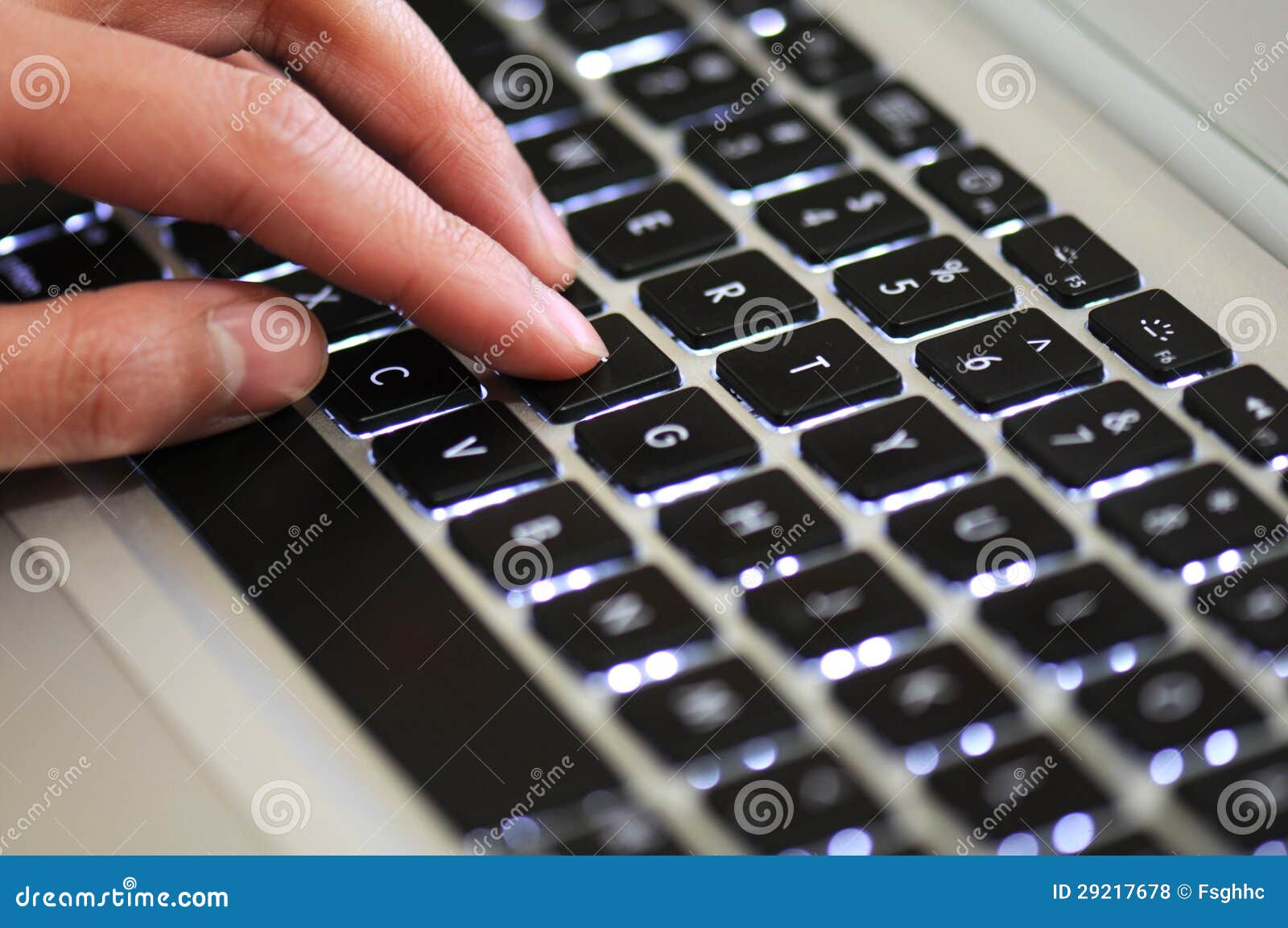 A Beautiful Woman Hand on a Black Keyboard with Li Stock Photo - Image ...