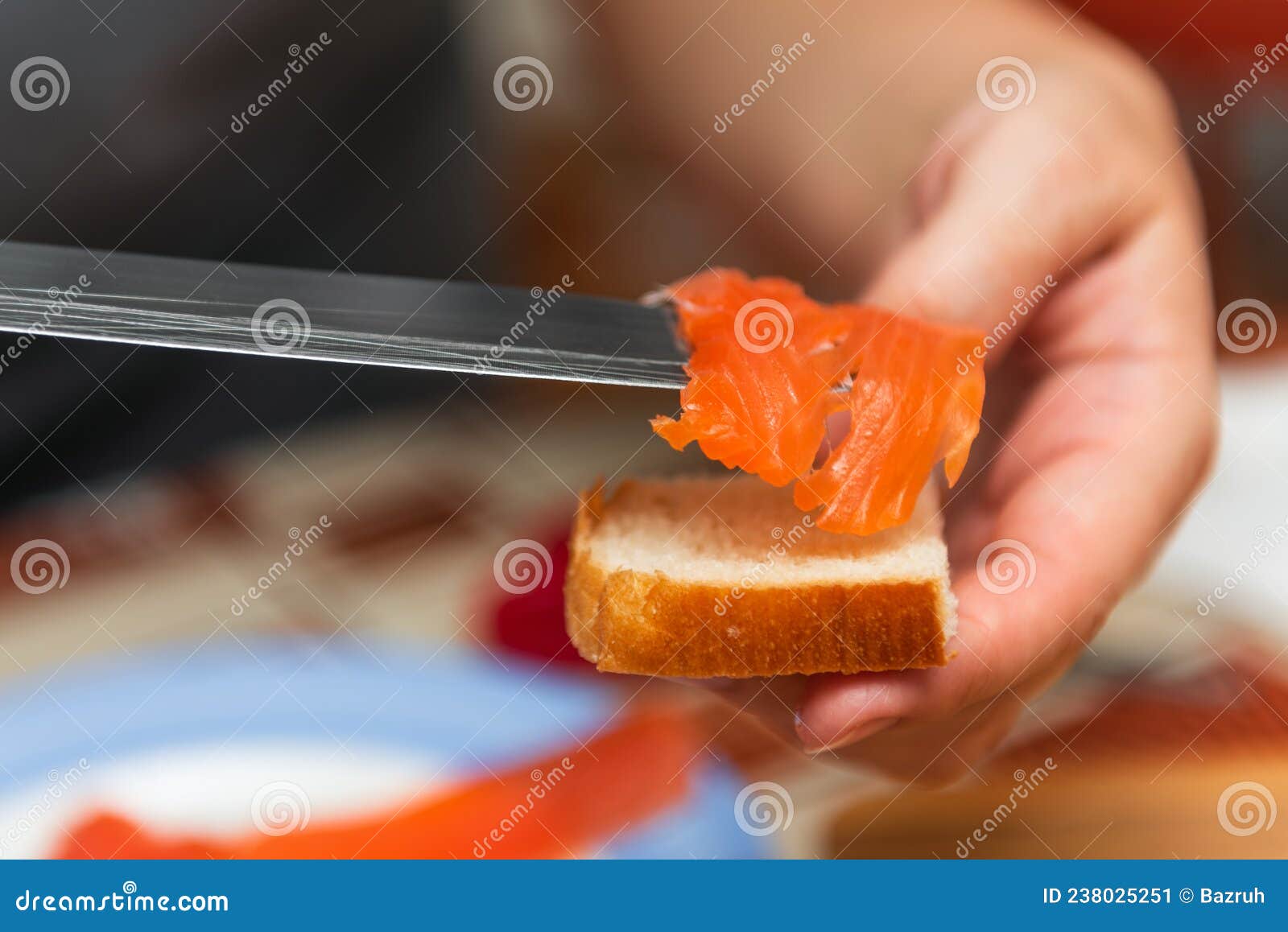 Hand with a Knife Cuts Red Salmon Fish for Sushi Stock Image - Image of ...