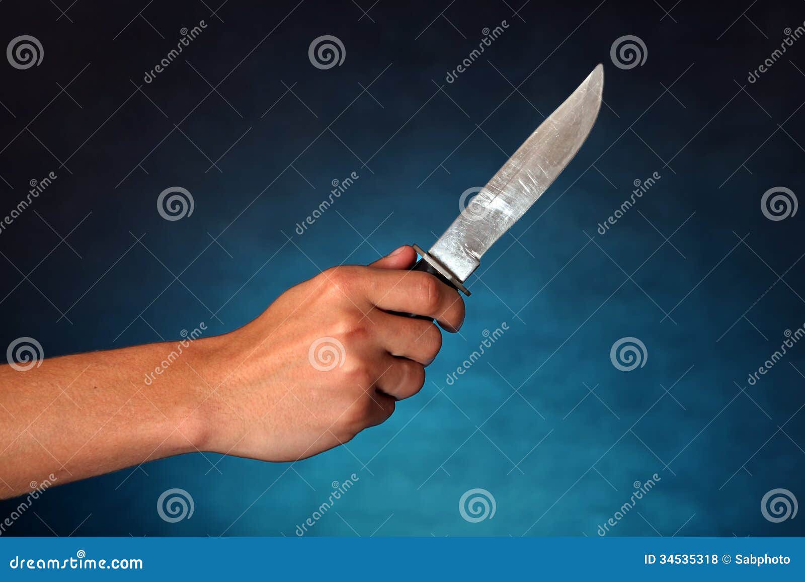 Hand with Knife stock photo. Image of darkness, human - 34535318