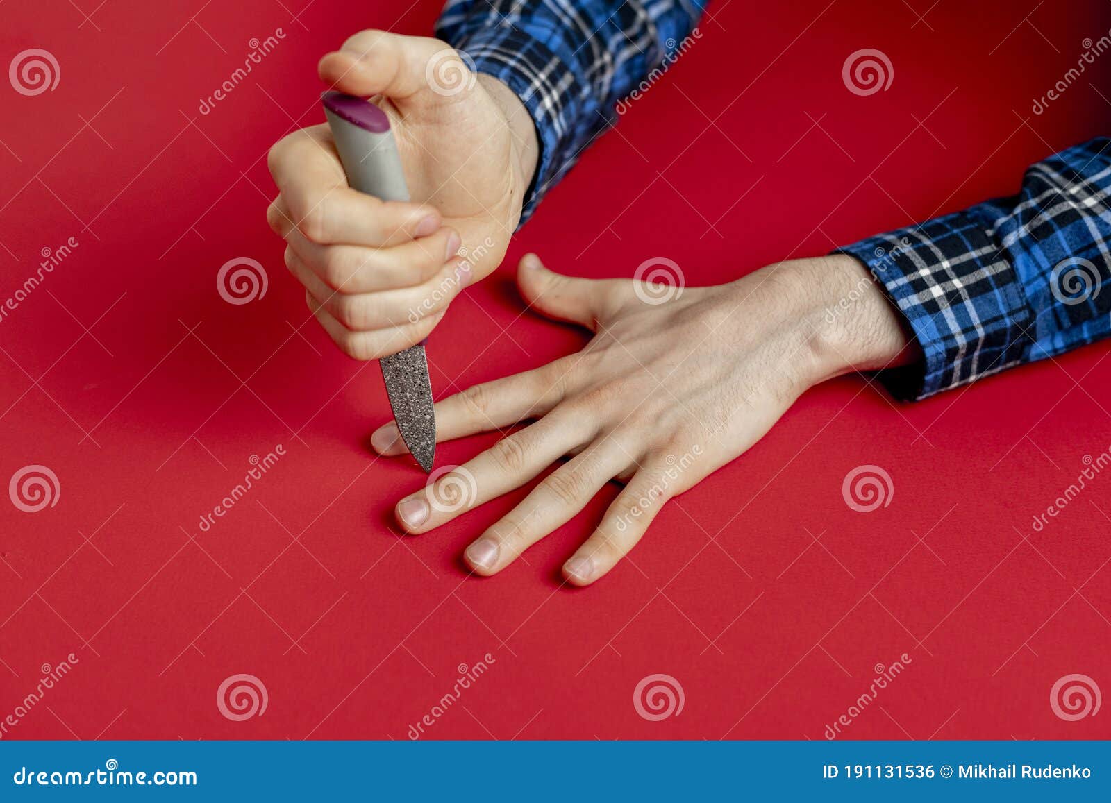 Hand with Knife Hitting between the Fingers on the Table, Playing the ...