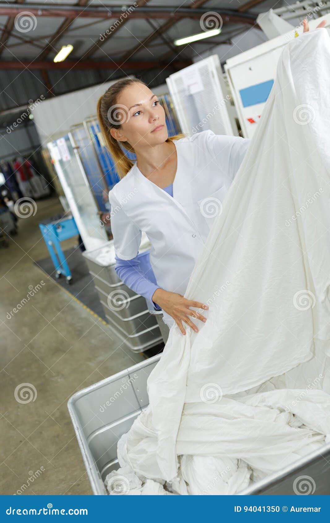 Hand Laundry Worker at Dry Cleaners Stock Photo - Image of hands ...