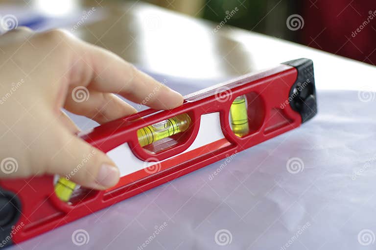 Hand and Level Measurement Tool Stock Image - Image of level, precision ...