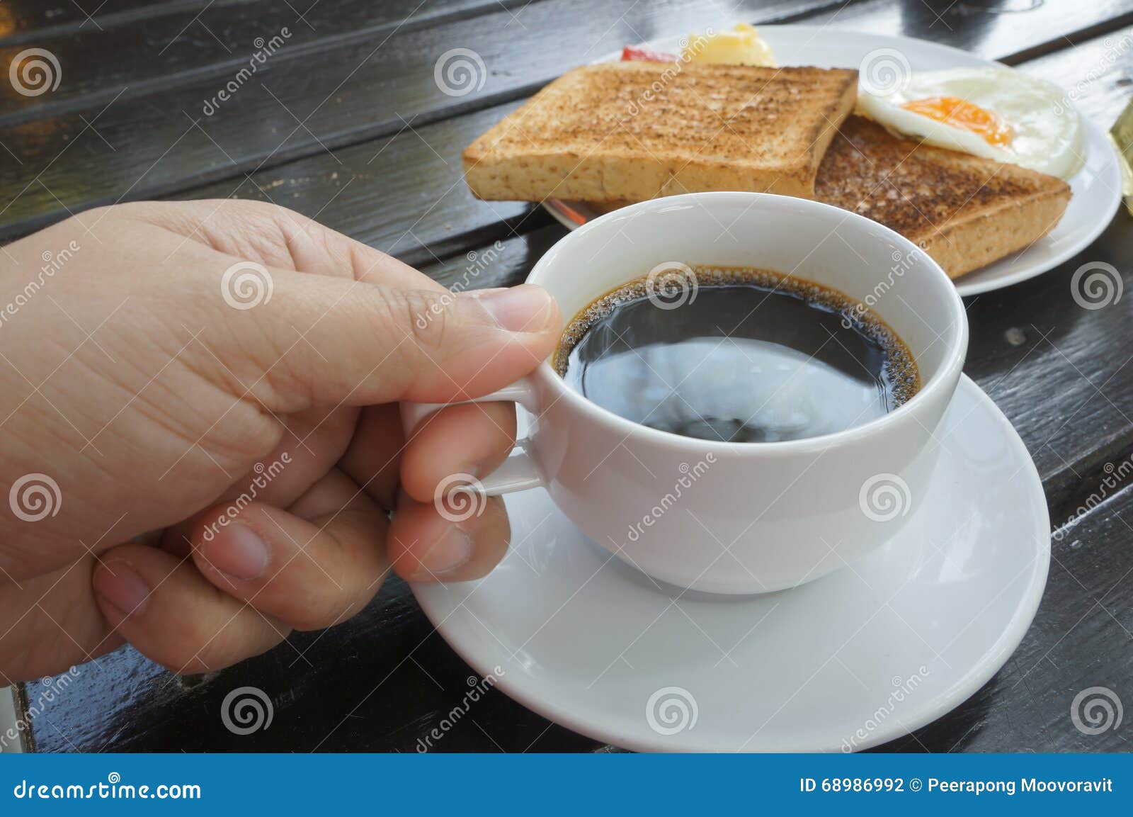 Hand lift coffee cup stock photo. Image of sleepy, food - 68986992