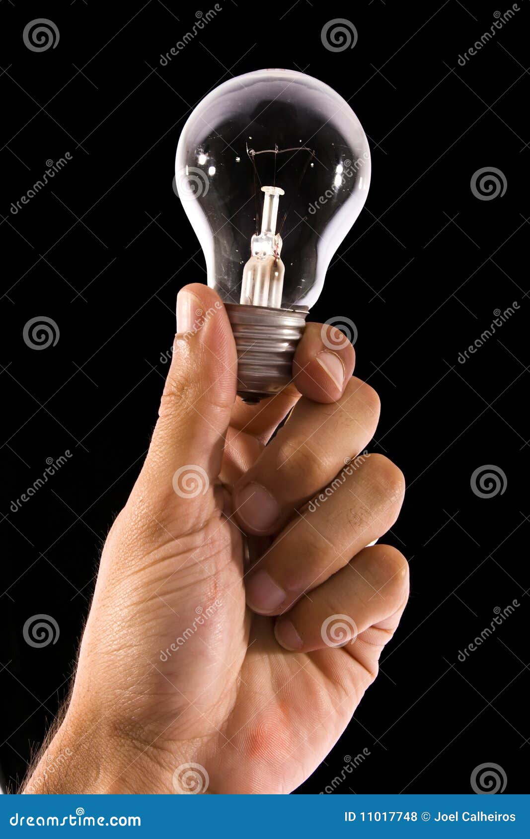 Hand with light bulb stock photo. Image of think, energy - 11017748