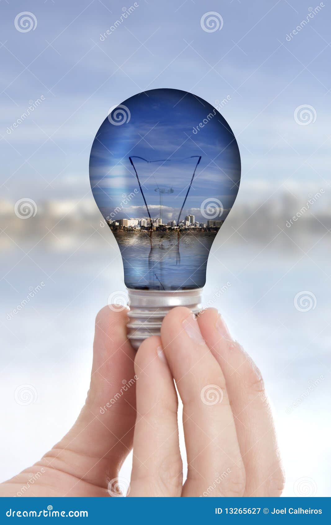 Hand with light bulb stock image. Image of environment - 13265627