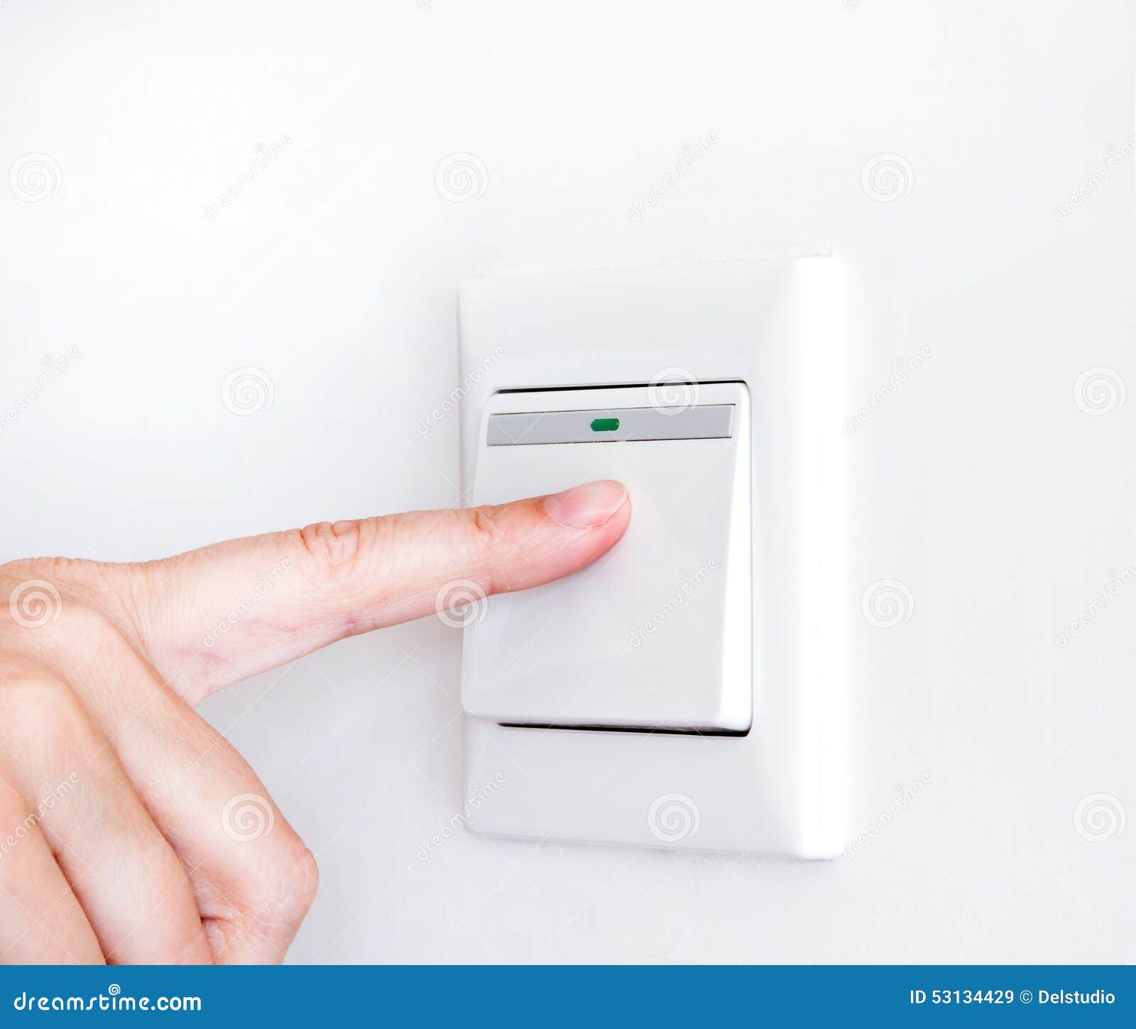 Hand on light switch stock image. Image of light, electric - 53134429