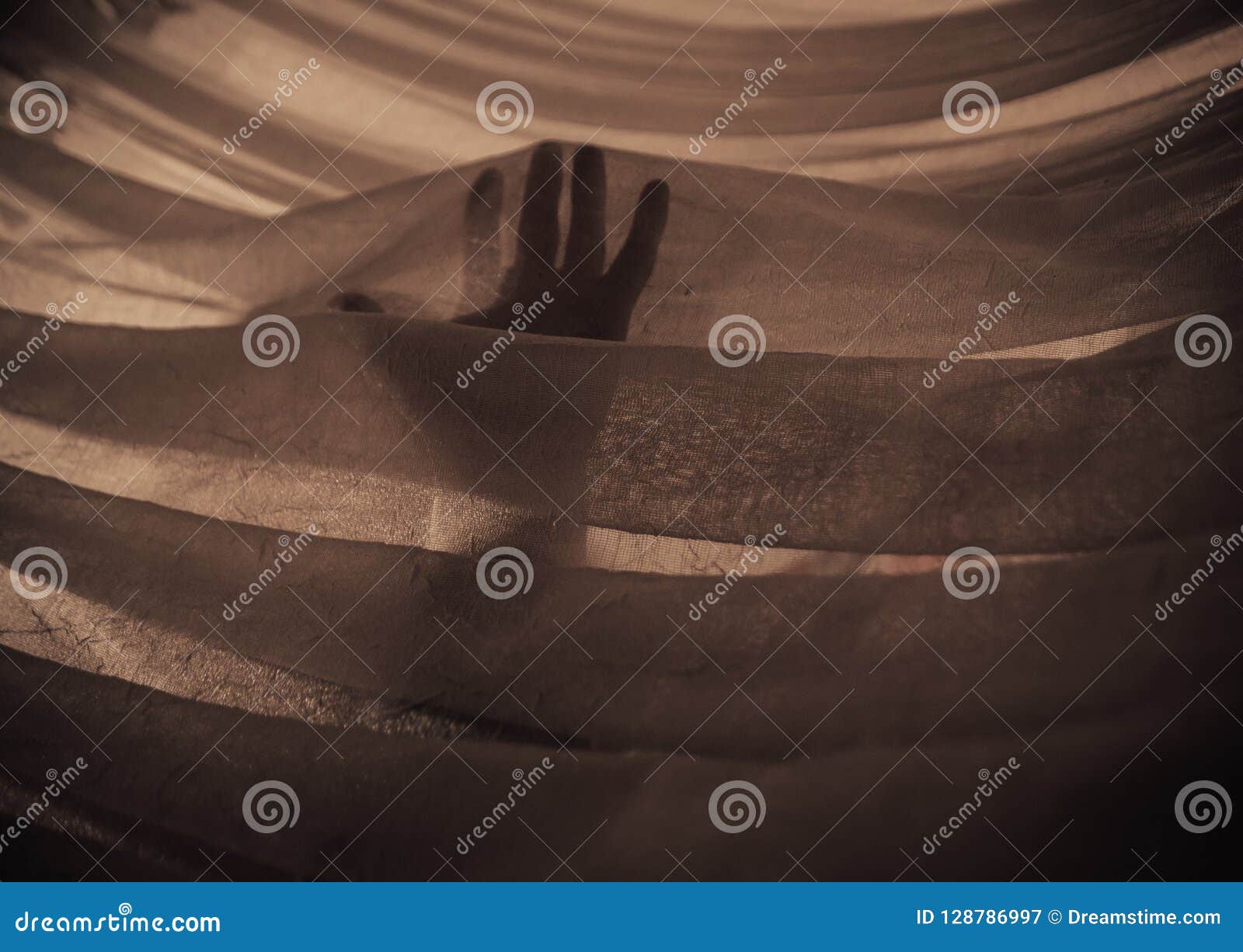 Hand in the Light Touching Fabric Stock Image - Image of minimal, dark ...