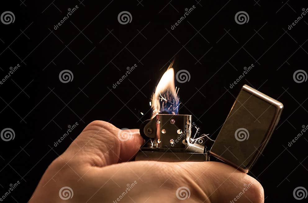 Hand and a lighter stock image. Image of background, bright - 49755029