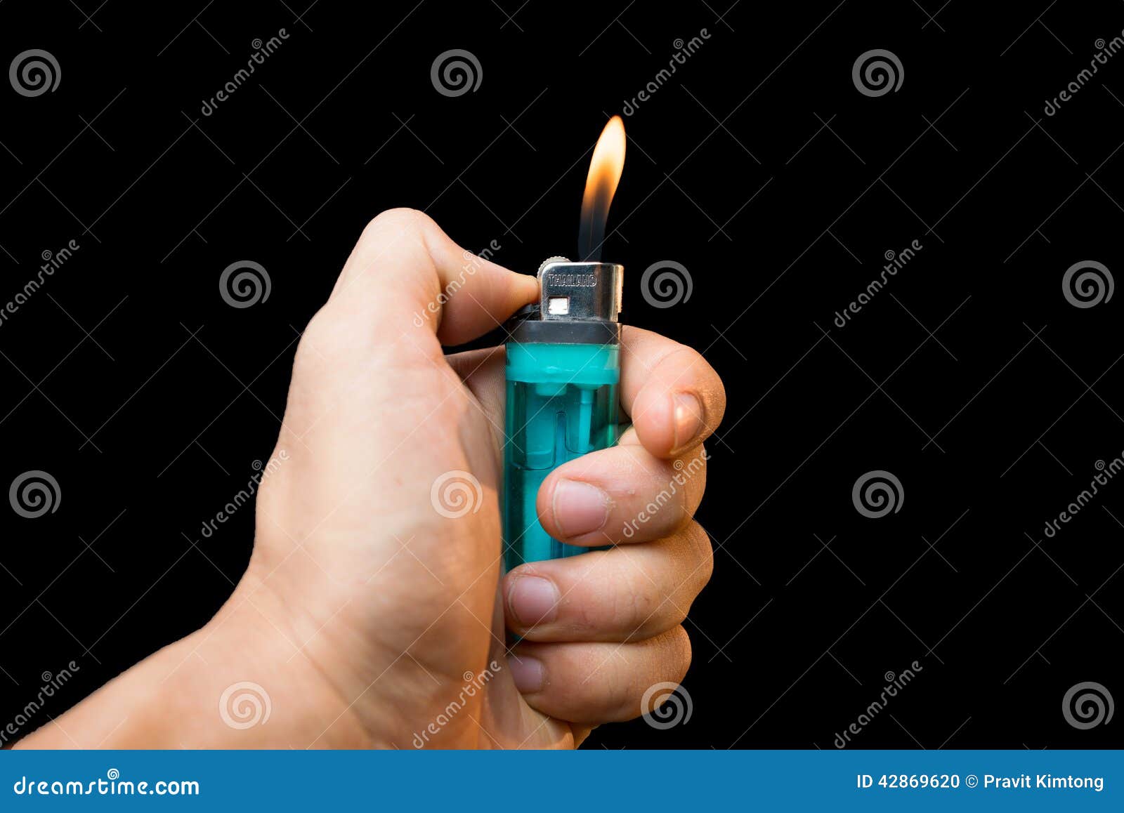 Hand with lighter igniting stock photo. Image of blackground - 42869620