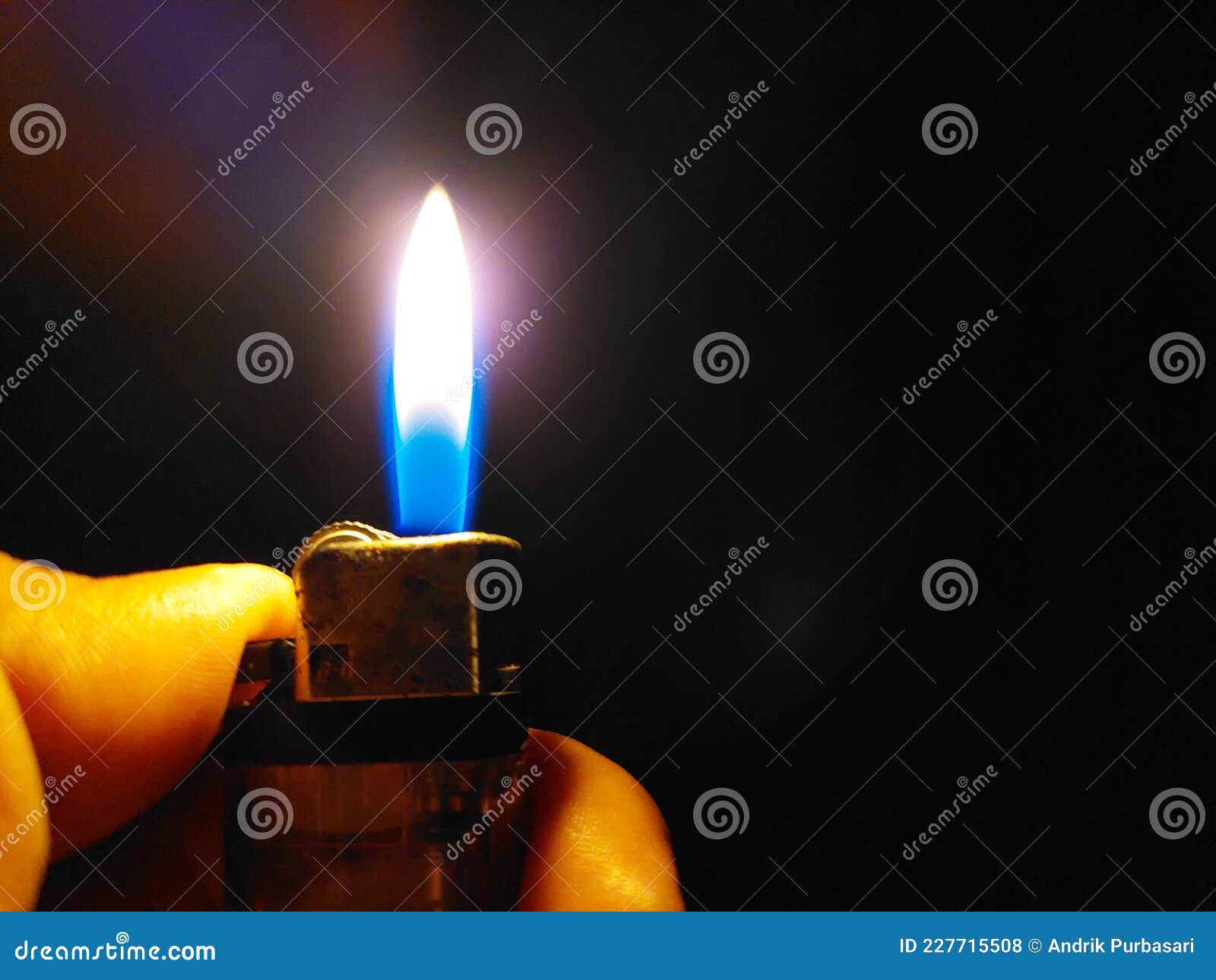 The Hand that Lights the Match for the Night Light Stock Photo - Image ...