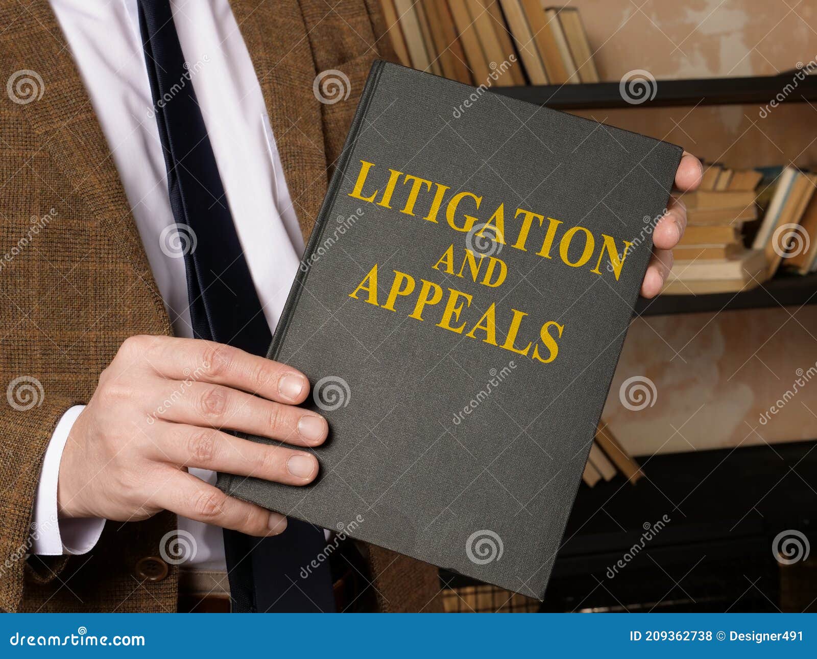 Hand with Litigation and Appeals Rules Book. Stock Photo - Image of ...