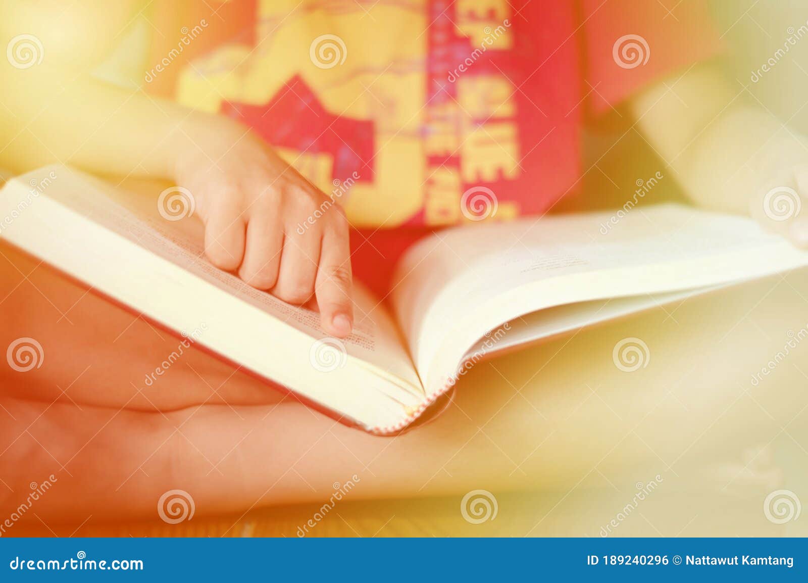 Hand of Little Boy Pointing To the Thick Book for Education and ...