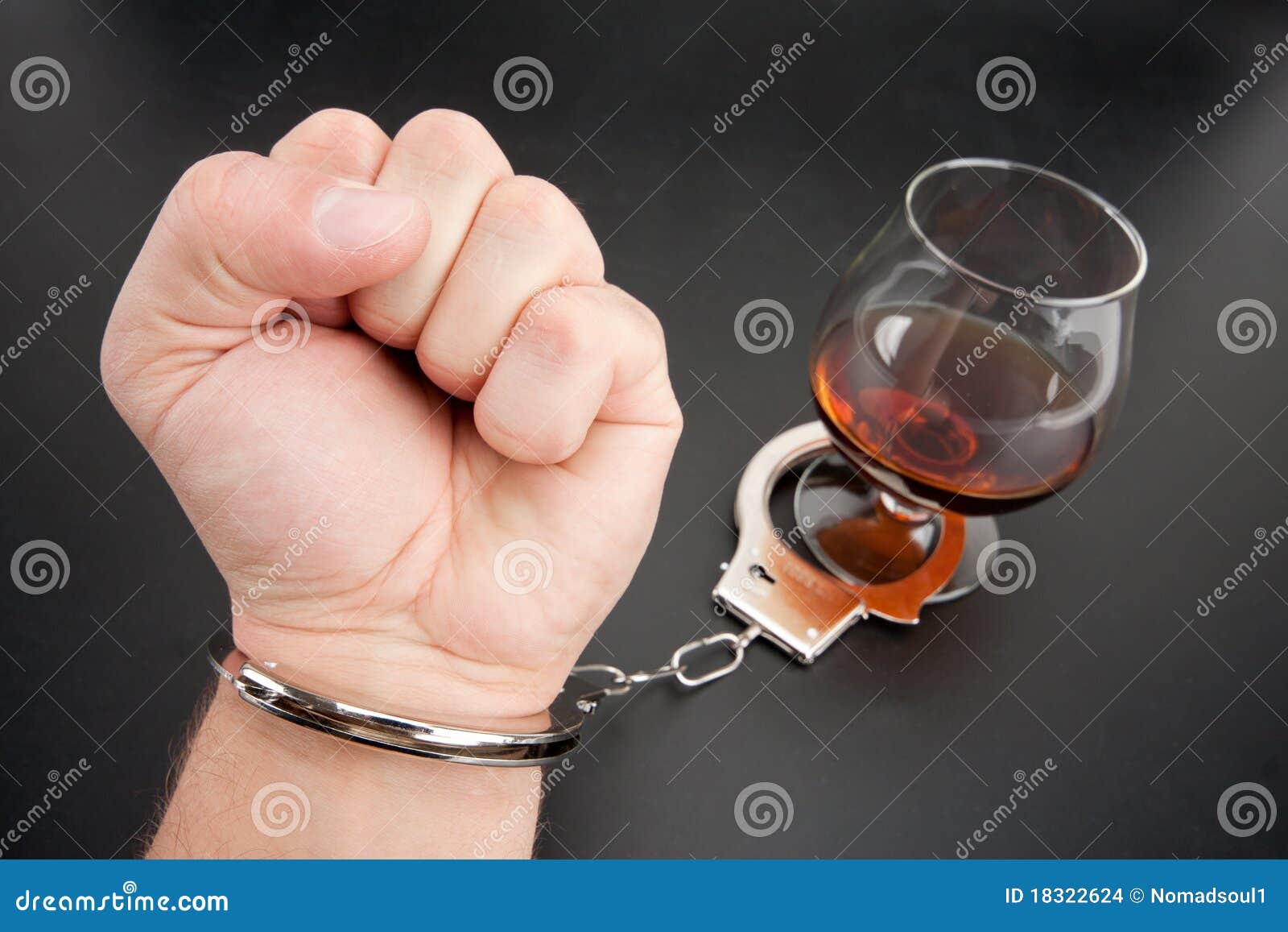 A Hand Locked To Glass of Alcohol Stock Photo - Image of glass, drink ...