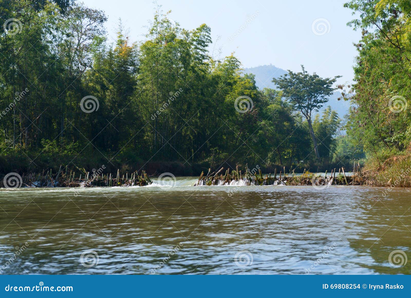 Hand Made Bamboo Dam Across a River Stock Photo - Image of design, rods ...
