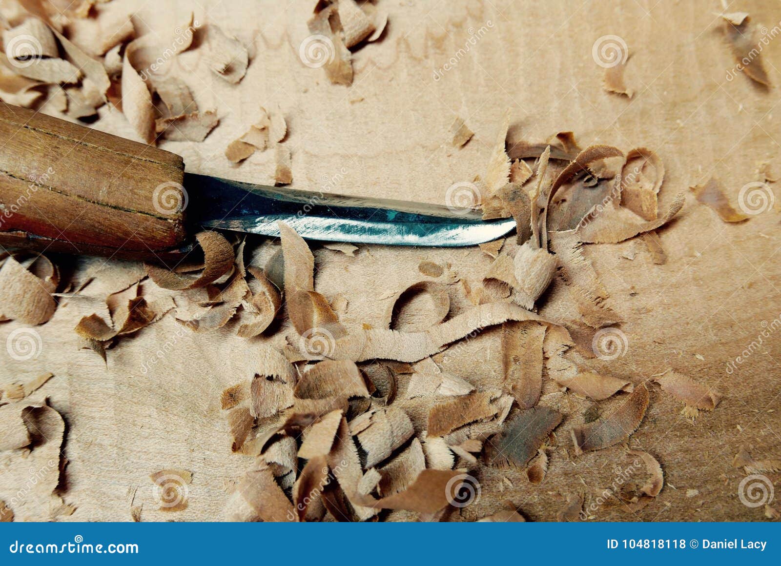 A Hand Made Carving Knife in a Maple Bowl, Showing the Texture of the ...