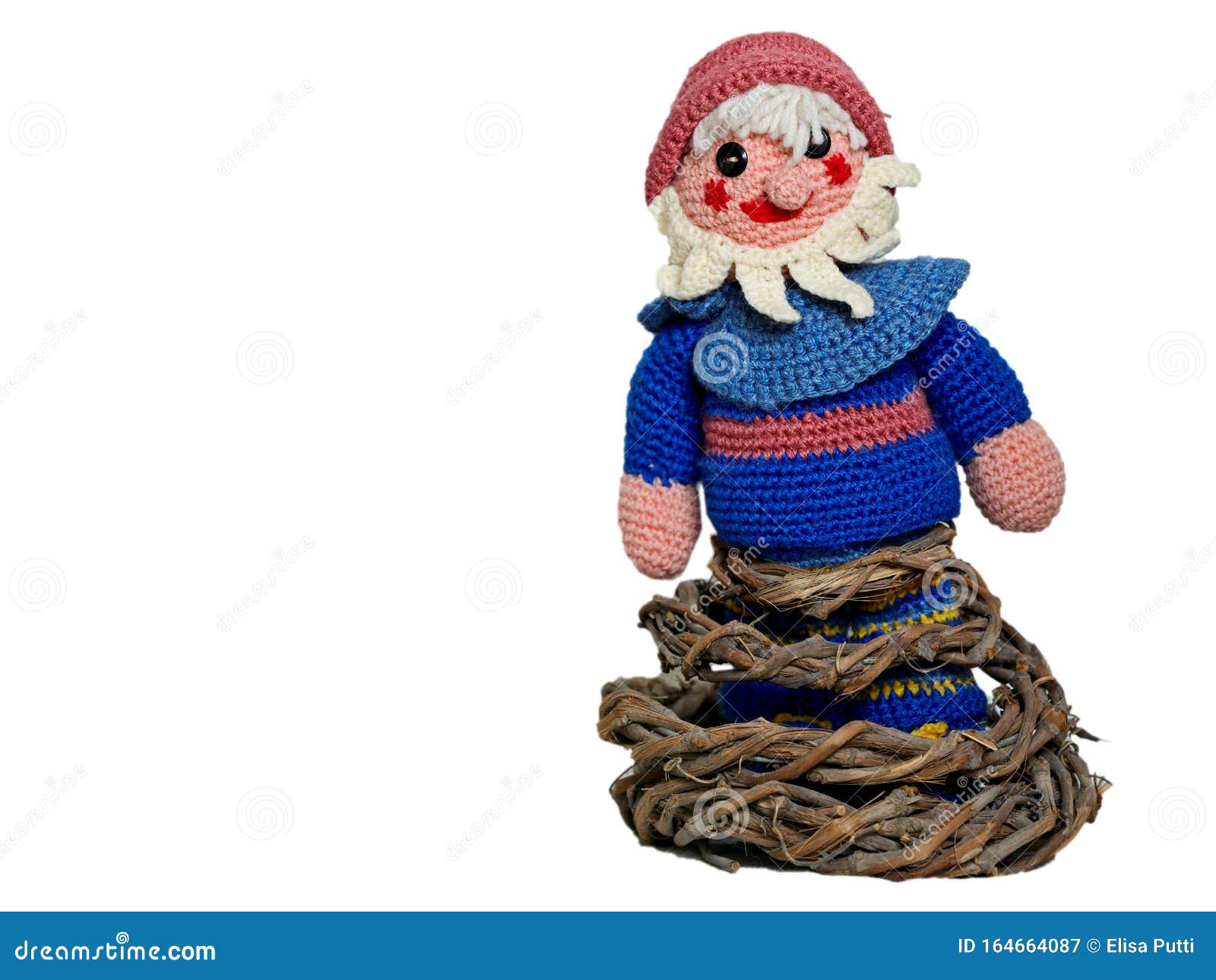 A Hand Made Elf with Red Cap and Beard Standing on a Rack Made of Tree ...