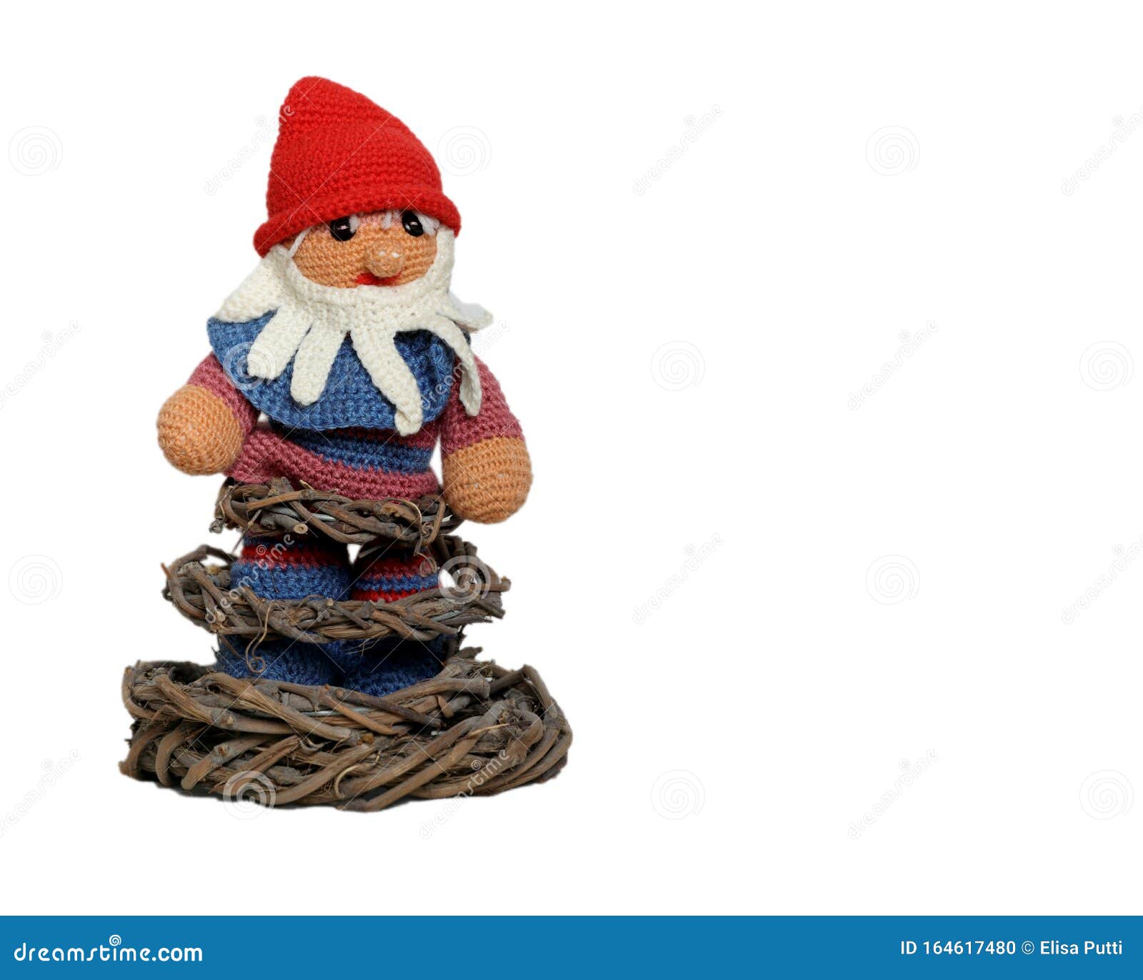 A Hand Made Elf with Red Cap and Beard Standing on a Stand Made of Tree ...