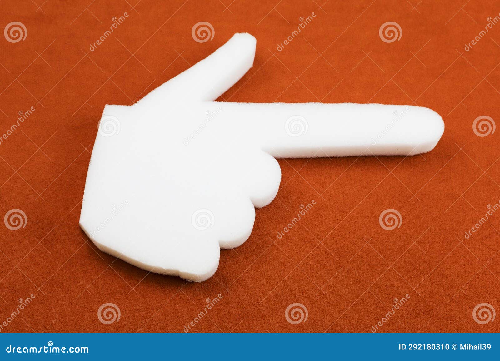 A Hand Made of Foam Rubber with an Index Finger on a Red Background ...