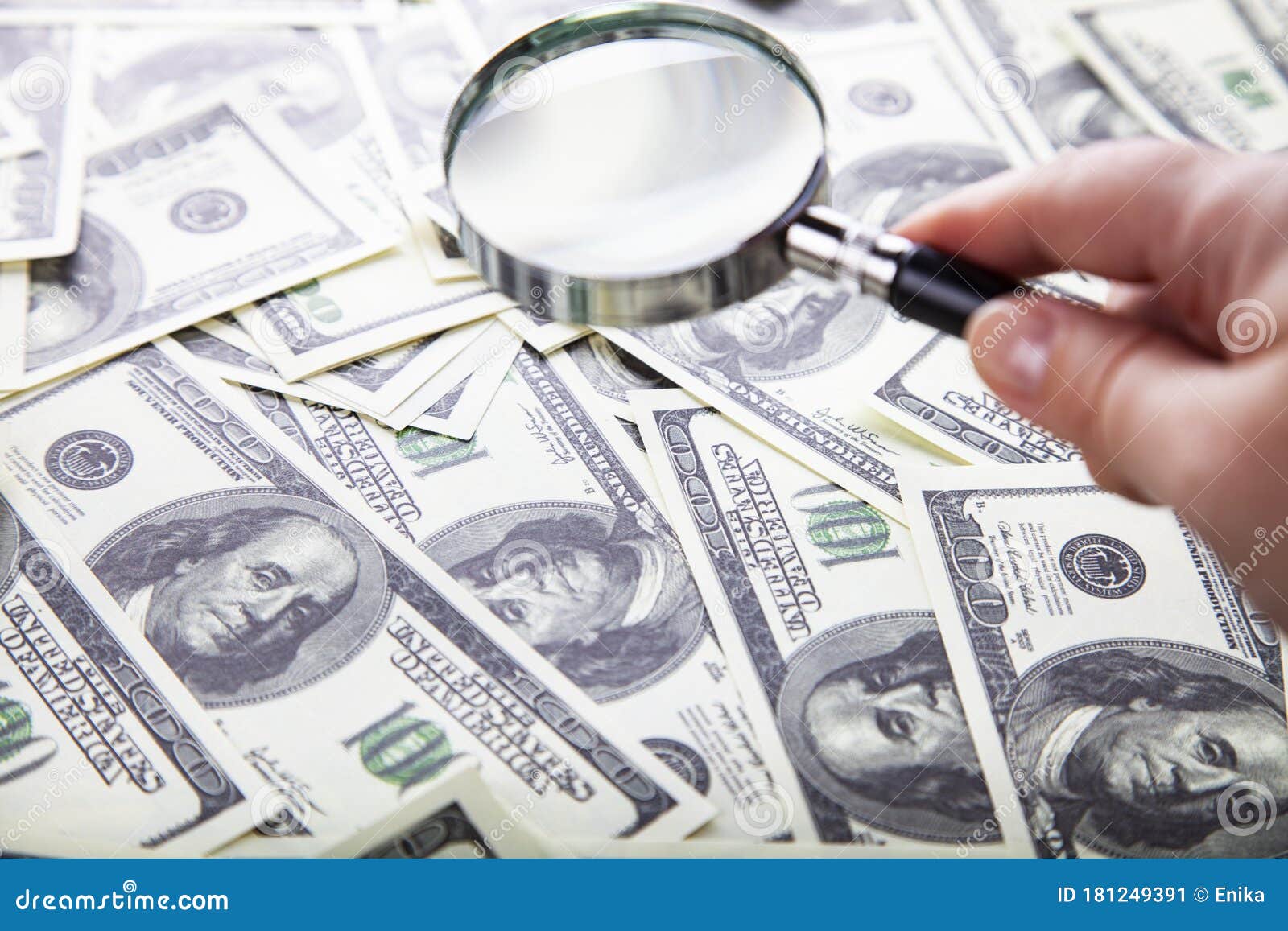 Hand with a Magnifier on a Background of Money Stock Image - Image of ...