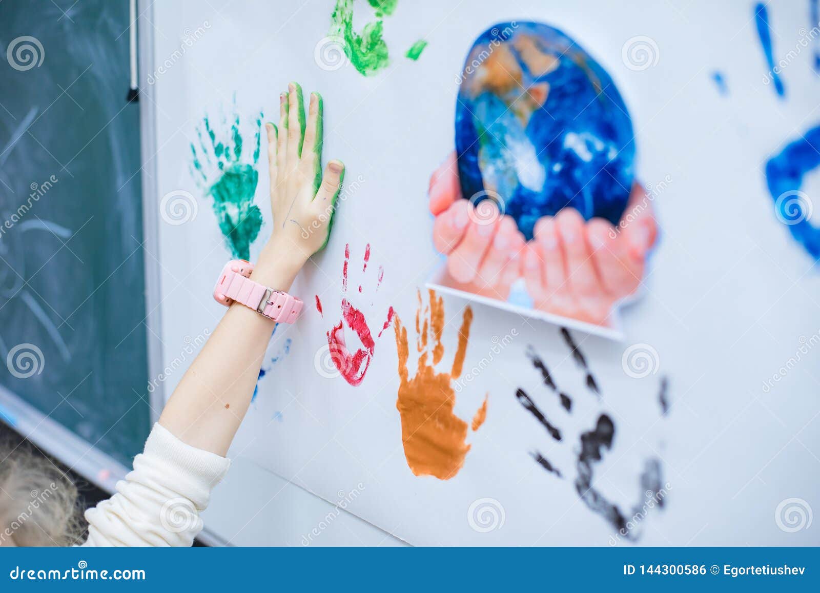 Hand Makes a Print on the Board. Stock Photo - Image of green, board ...