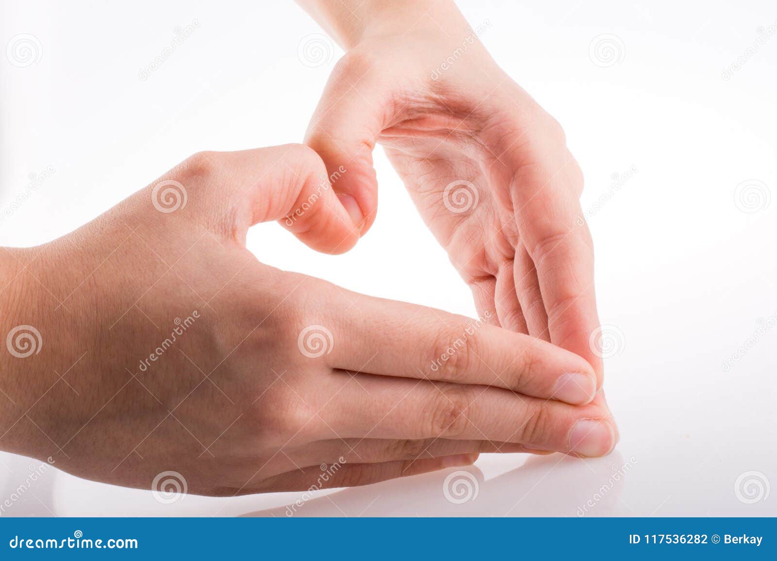 Hand making a heart stock photo. Image of person, shape - 117536282