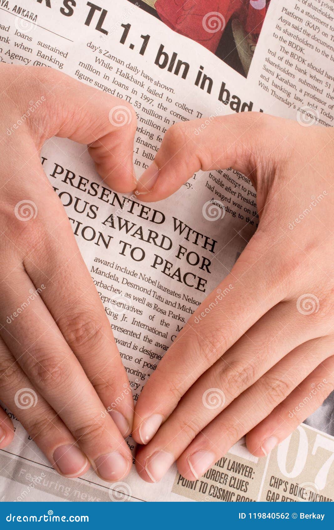 Heart on a newspaper stock photo. Image of headline - 119840562