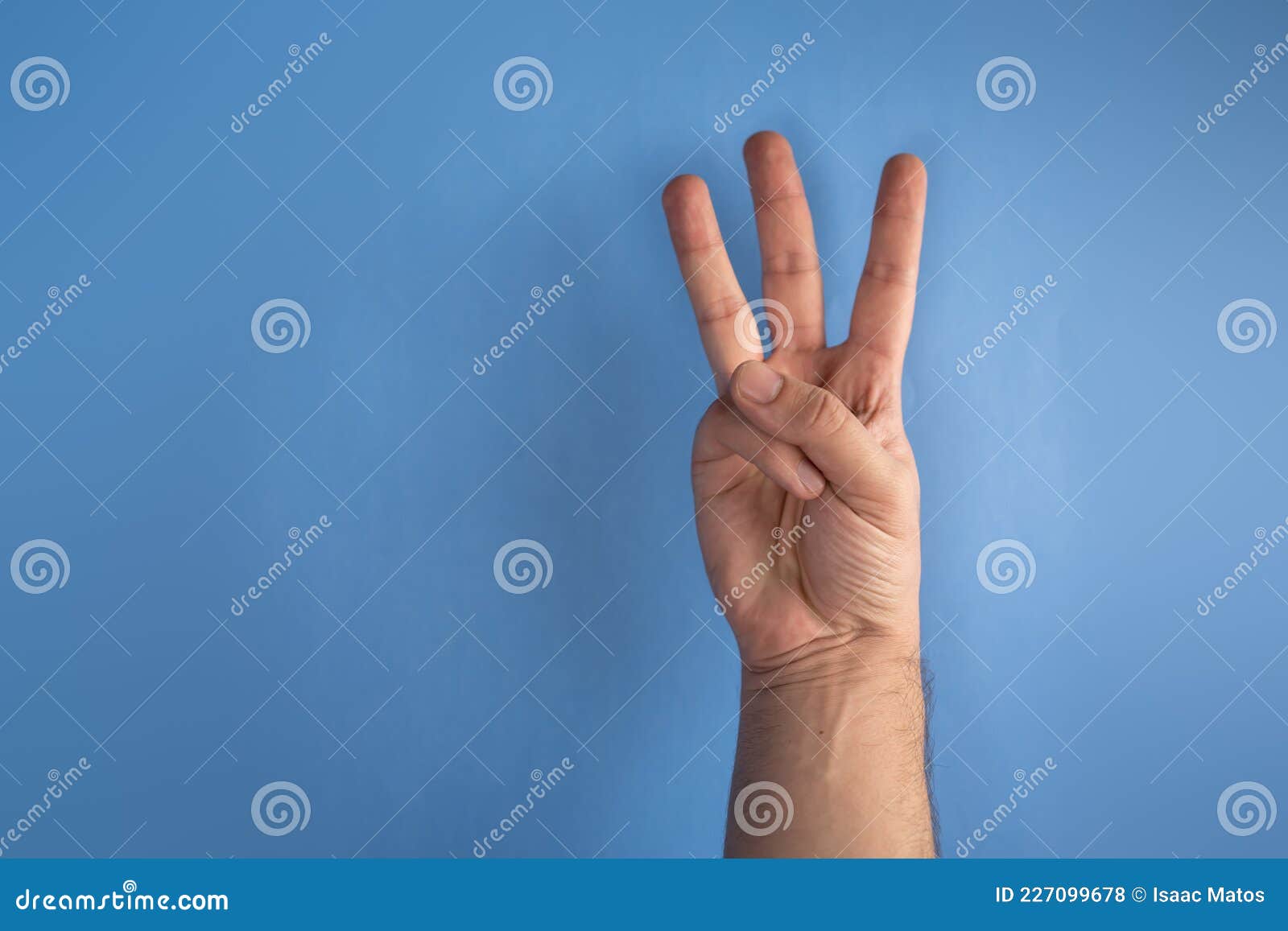 Hand Making Number 3 on Blue Background. Stock Photo - Image of copy ...