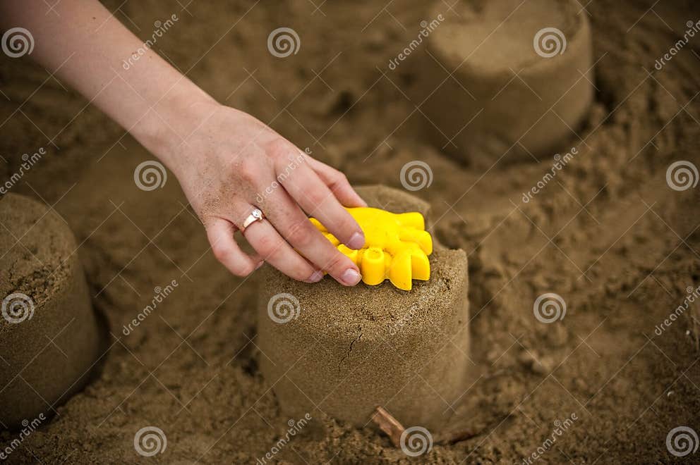 Hand Making a Sand Mold Using Molds Stock Photo - Image of sandcastle ...