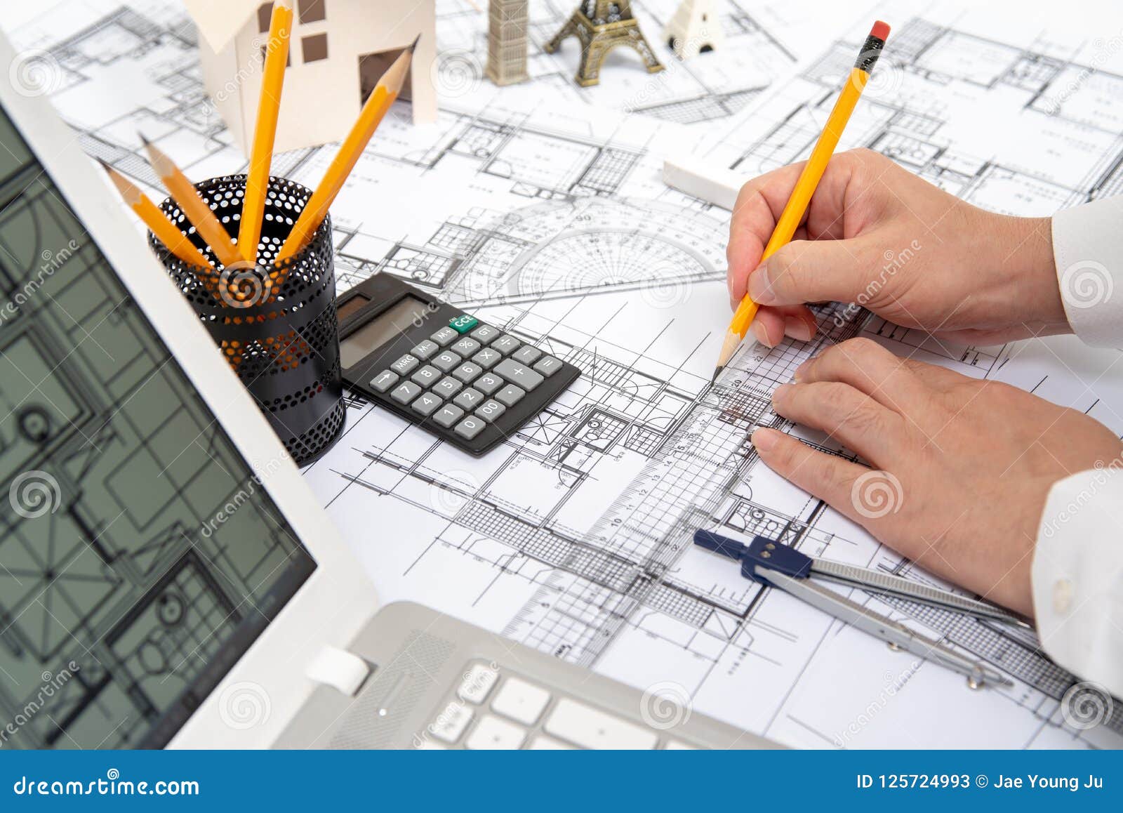 The Hand of a Male Architect Drawing a Design Using a Pencil. Stock ...
