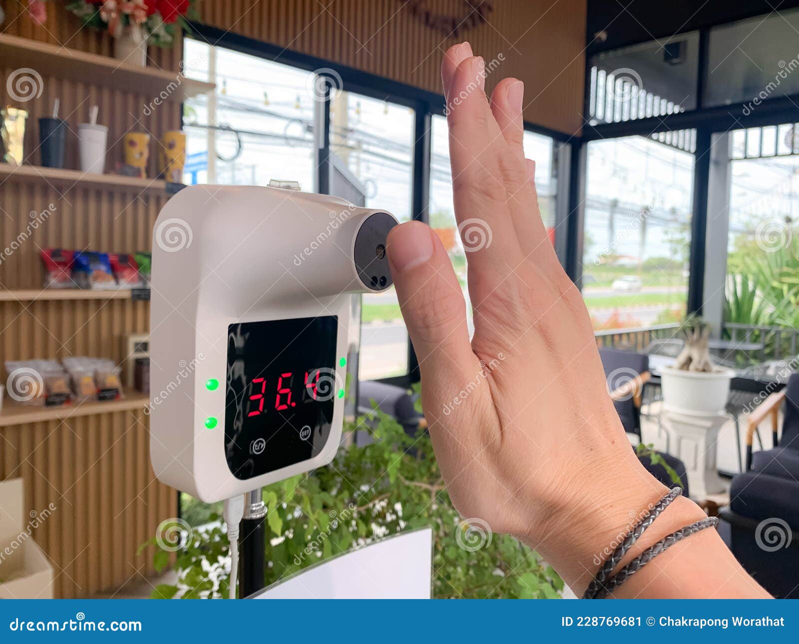 Hand of Man Checking Temperature before Entering Cafe with Digital ...