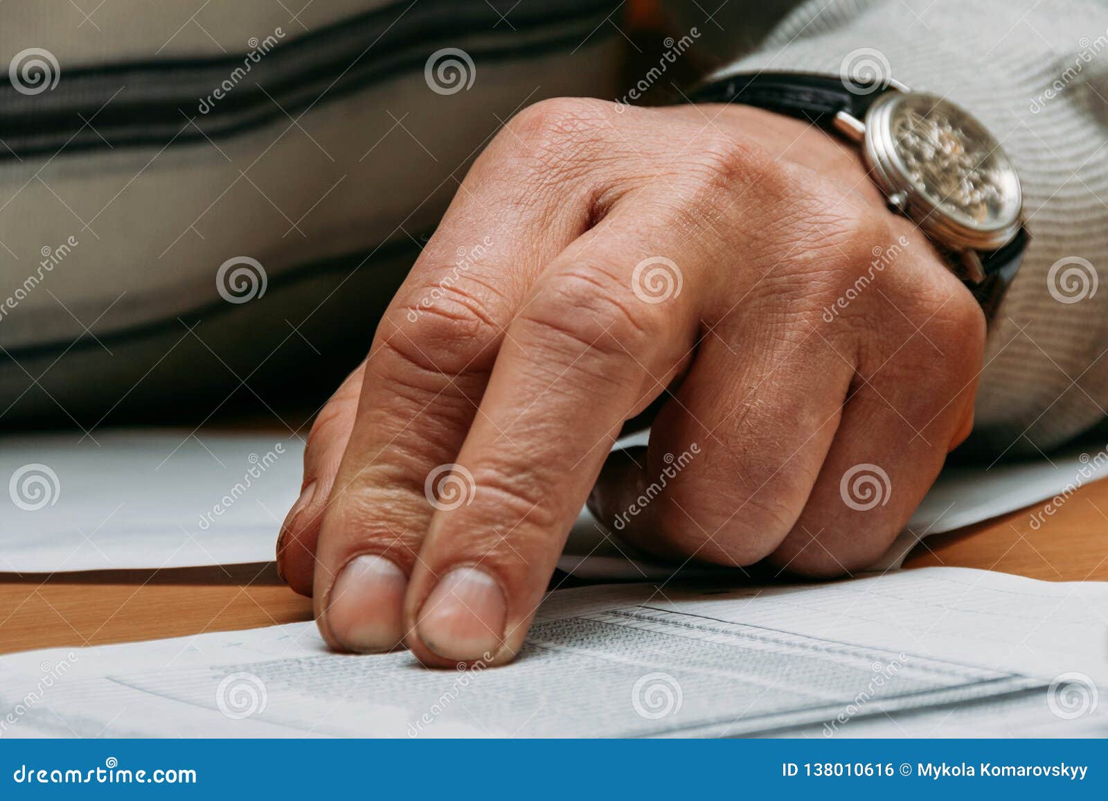 Hand of man with document stock photo. Image of colleague - 138010616