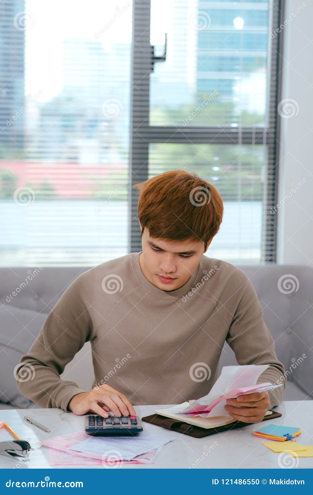 Hand Man Doing Finances and Calculate on Desk about Cost at Home Stock ...