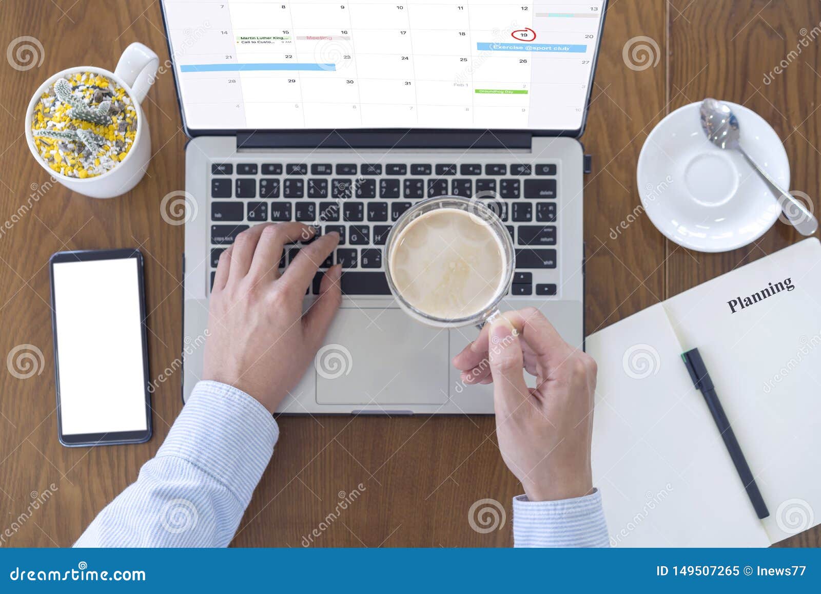 Hand of Man Drinking Milk Coffee and Using Computer Laptop with ...