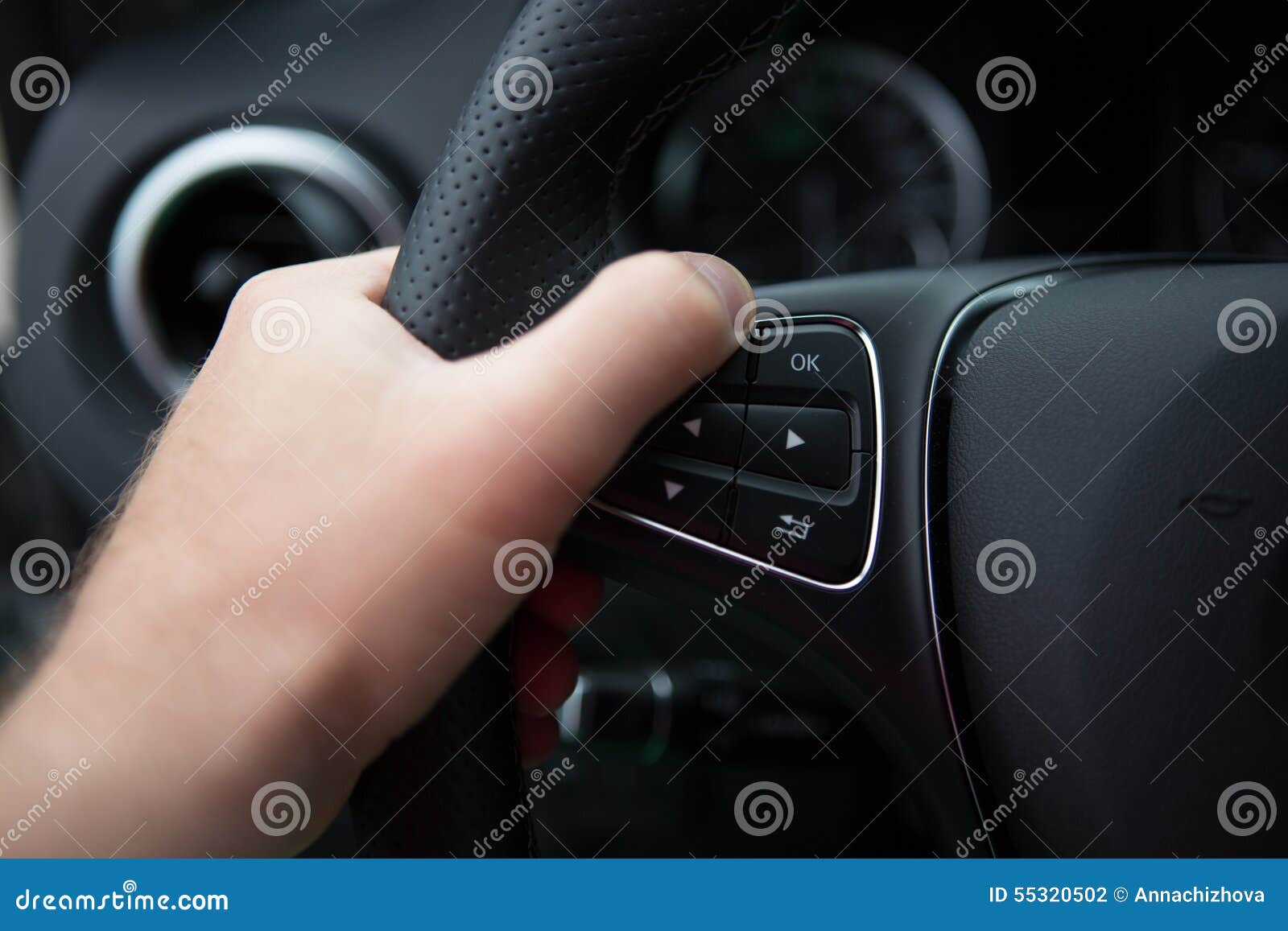 Hand of man driving a car stock photo. Image of odometer - 55320502