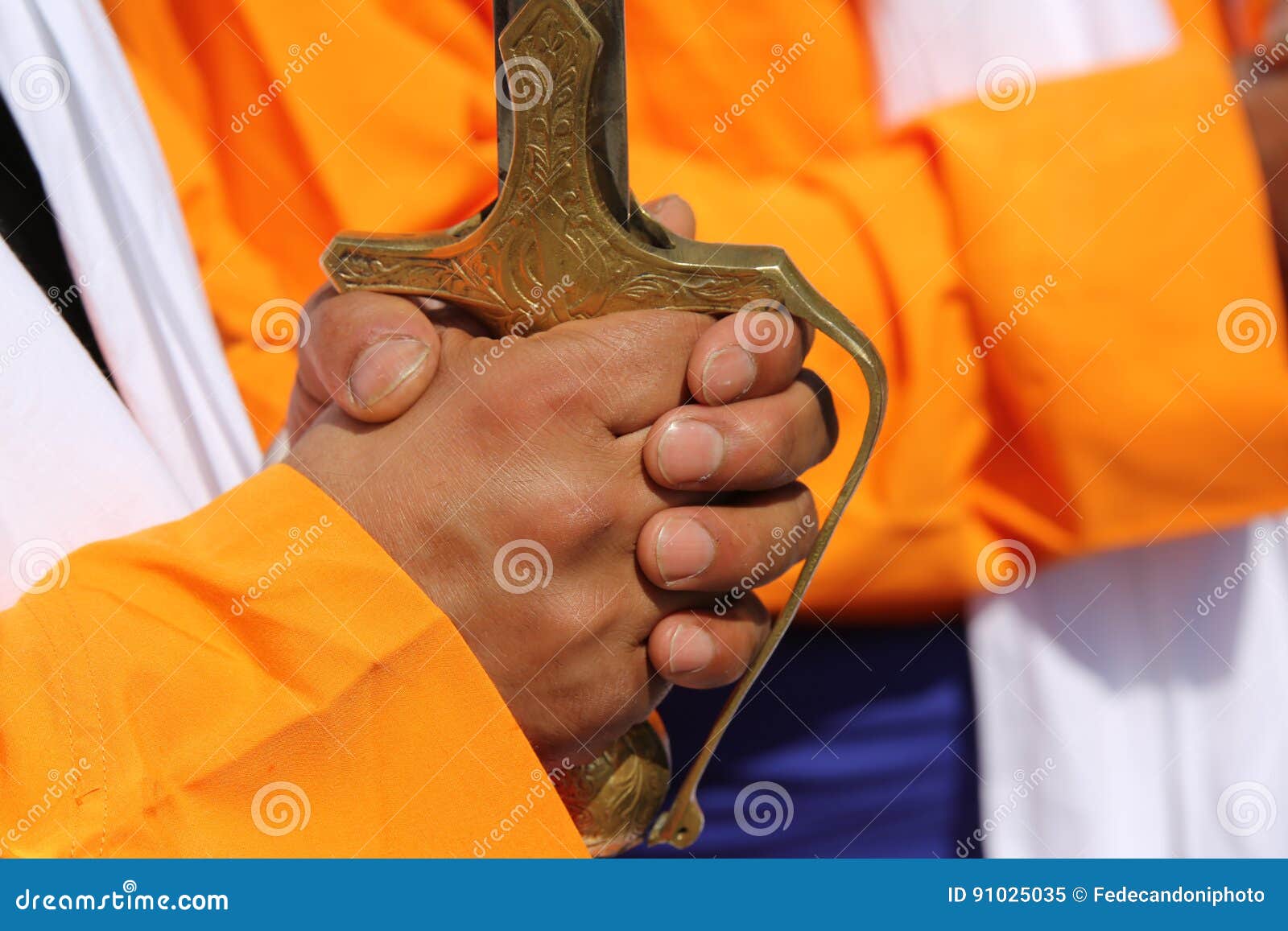 Hand of Man and Hilt of the Sword during the Event Stock Image - Image ...