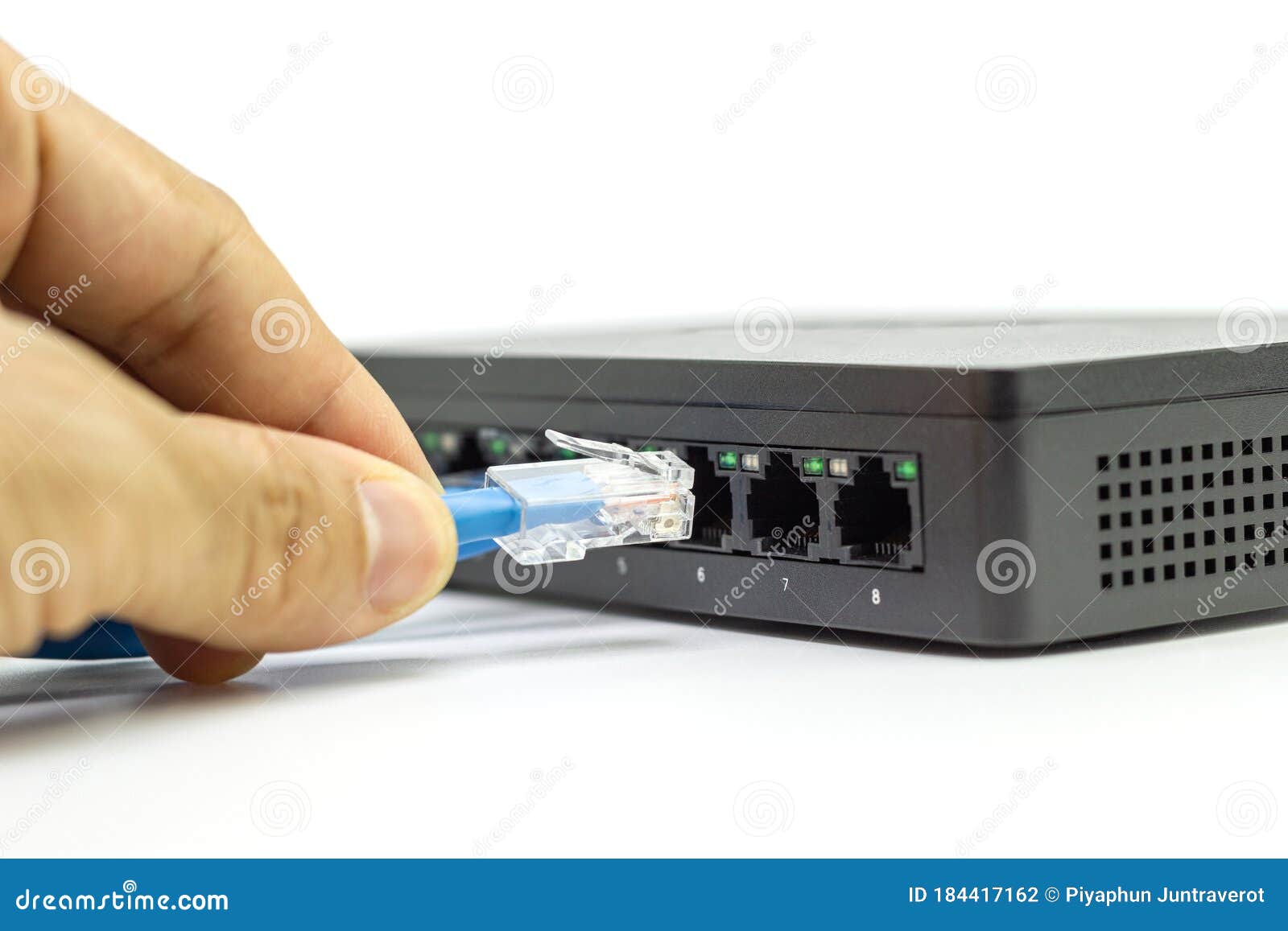 Hand of Man Holding the Blue Network Cables Connect Port Switch on ...