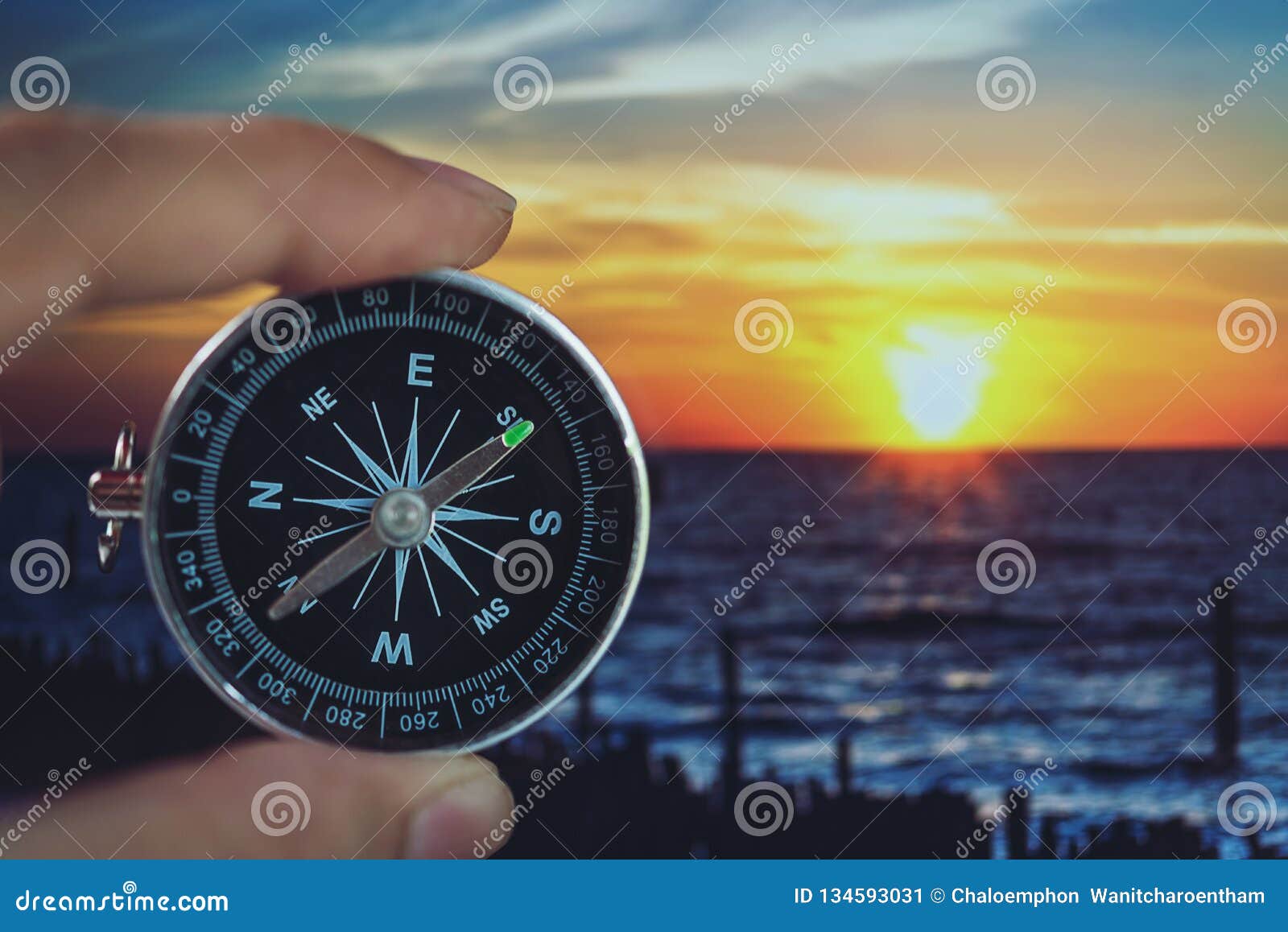 Hand of Man Holding Compass in Navigation To Tourist Attraction Stock ...