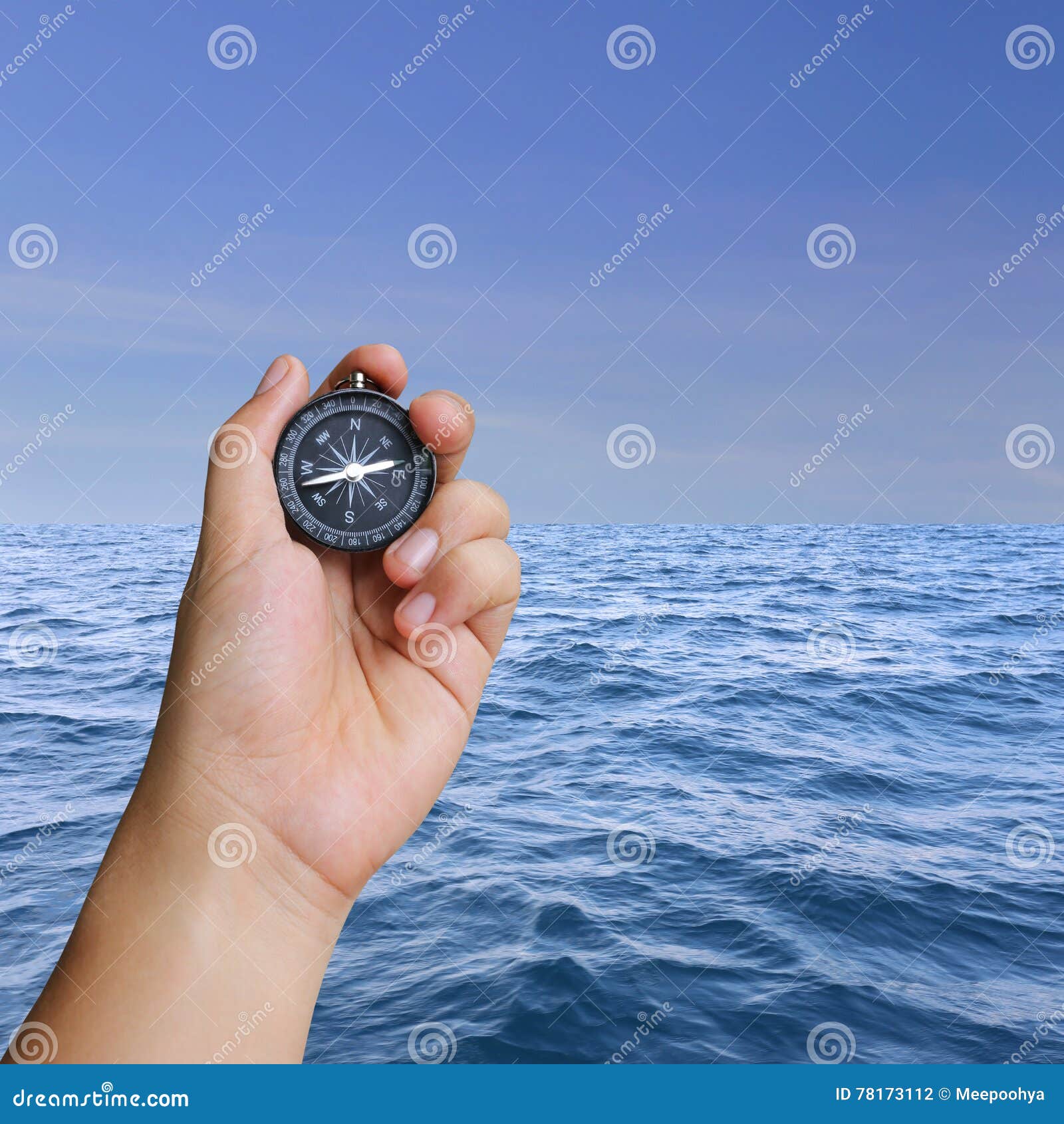 Hand of Man Holding a Compass and View Sea. Stock Photo - Image of ...