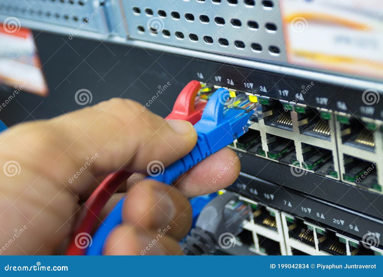 Hand of Man Holding the Network Cables To Connect Lan Port Stock Photo ... Hand of Man Holding the Network Cables To Connect Lan Port Stock Photo ...