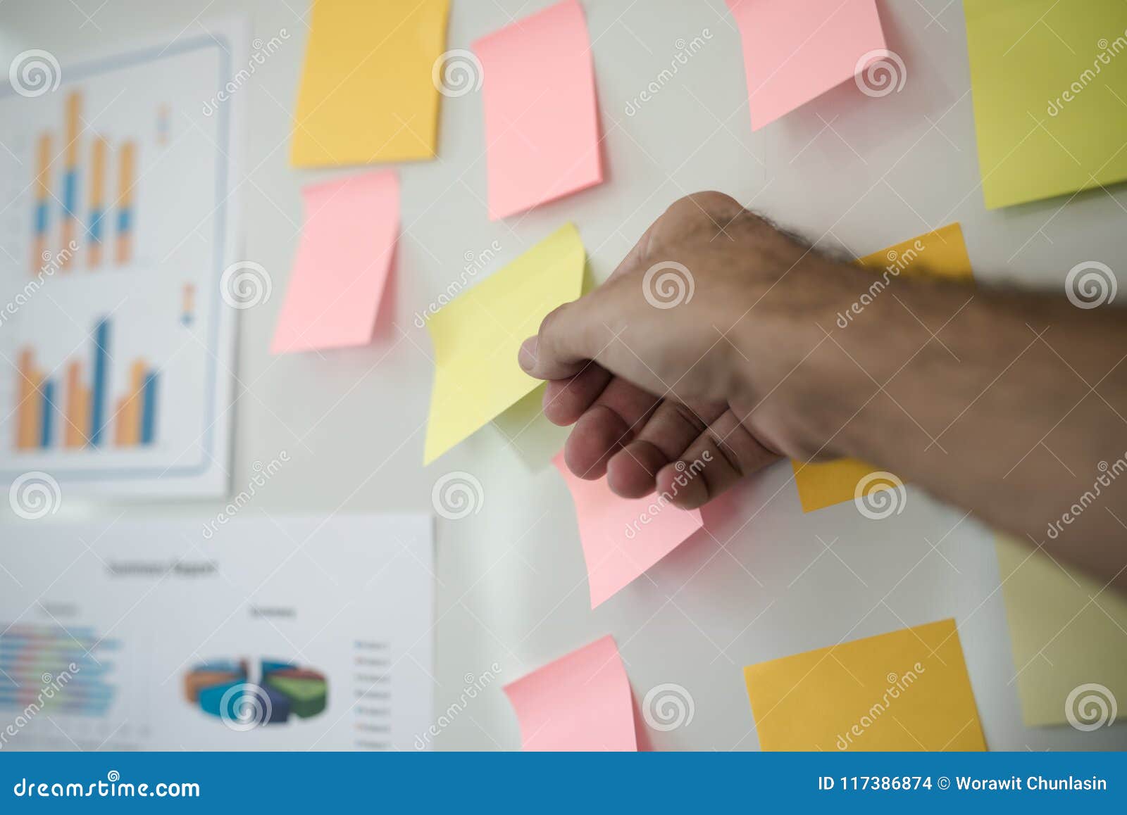 Hand of Man Holding Post-it. for Brainstorm Strategy Workshop B Stock ...